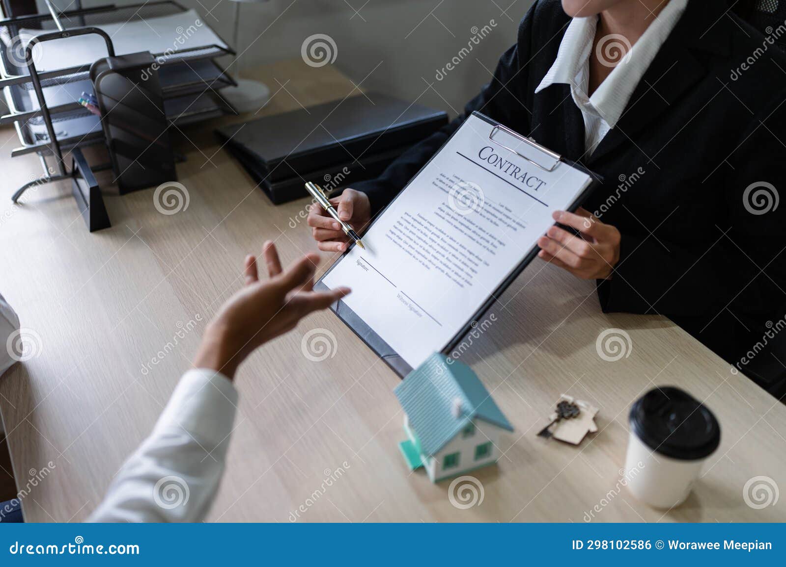 Professional Real Estate Agent Guiding and Explaining the Document ...