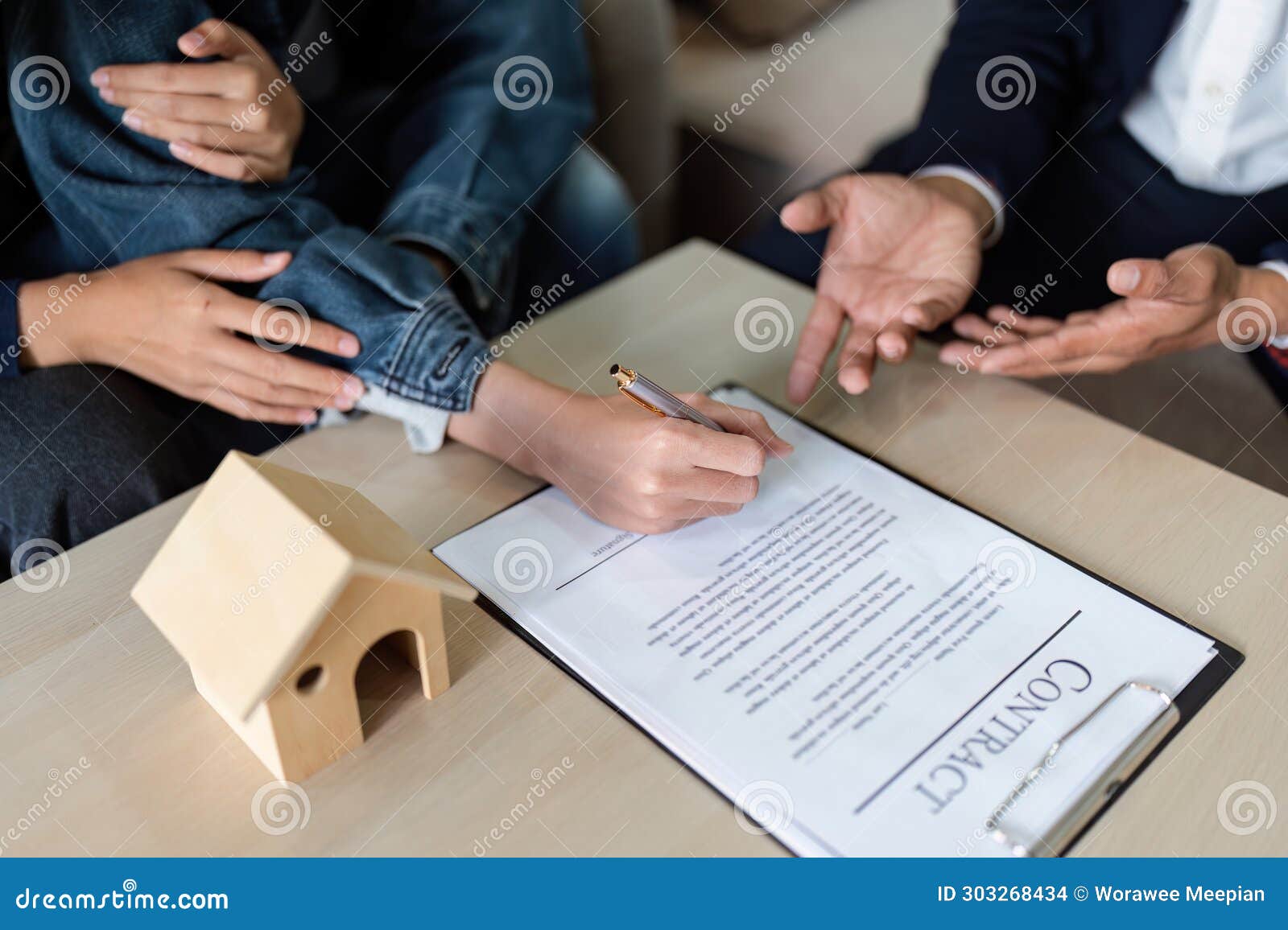 Professional Real Estate Agent Guiding and Explaining the Document ...