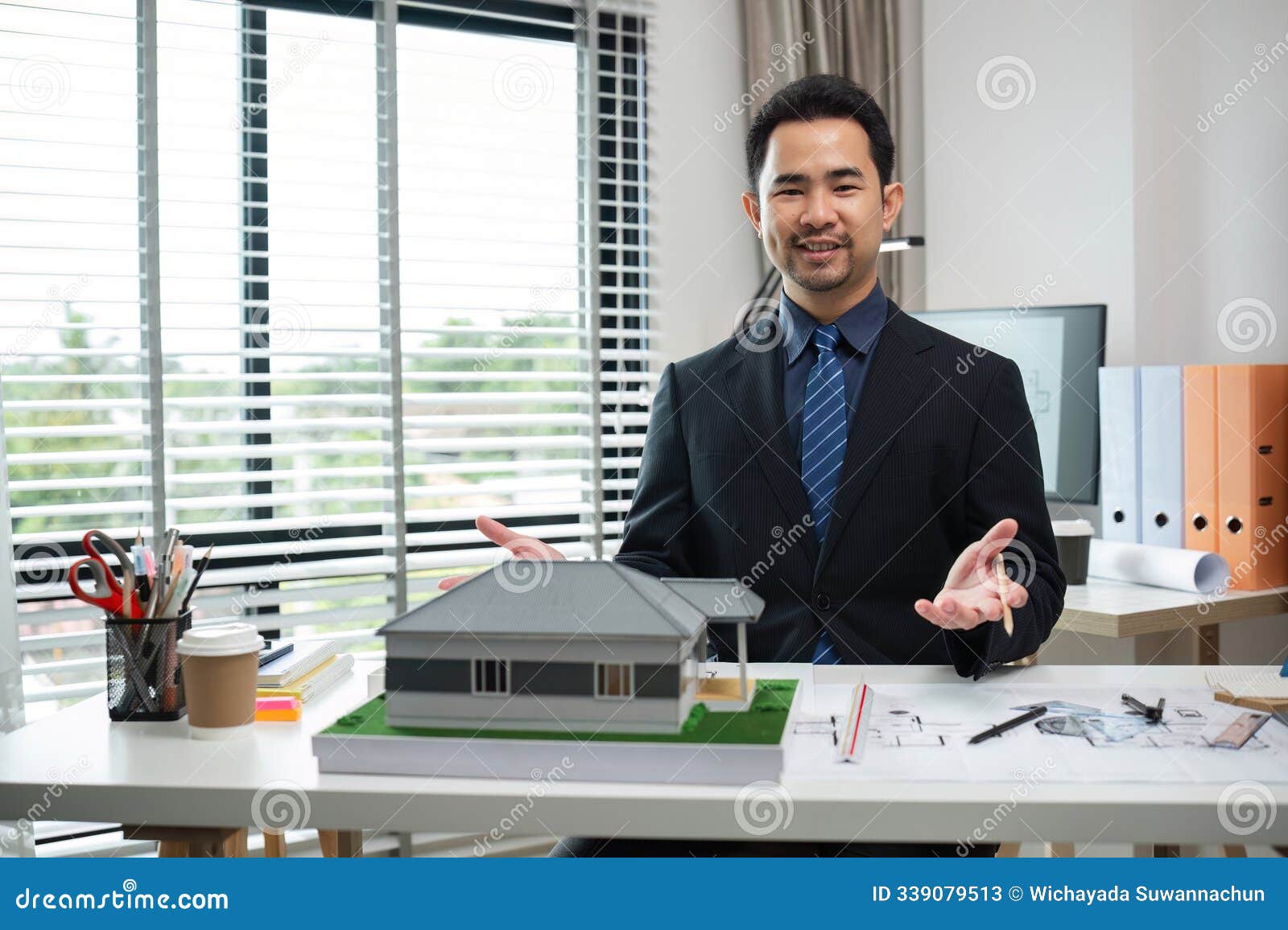 Professional Real Estate Project Sales Representative in Modern Office ...