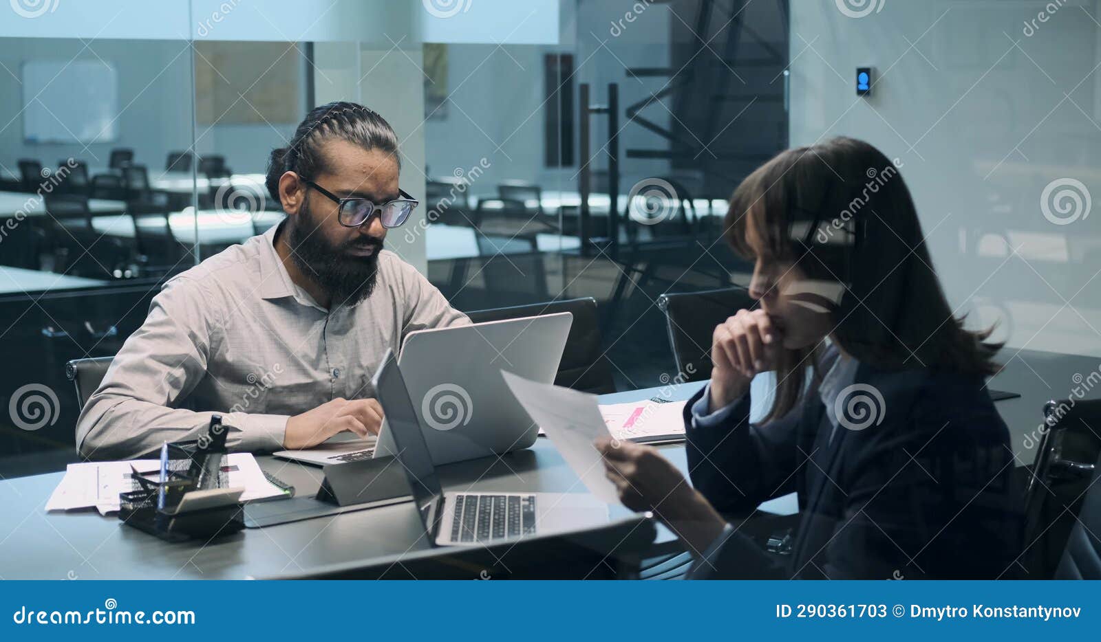 Serious Managerial Pair Engaged with Laptops in Office Stock Video ...