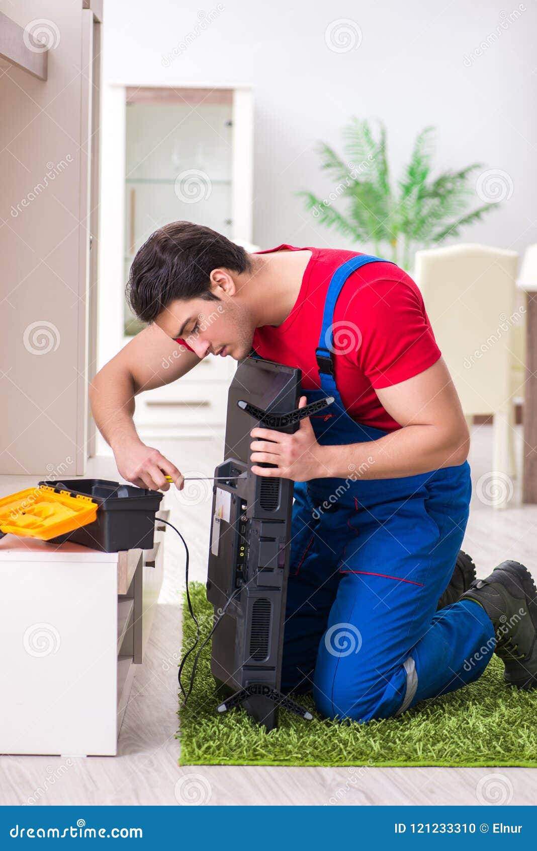 The Professional Repair Engineer Repairing Broken Tv Stock Photo ...