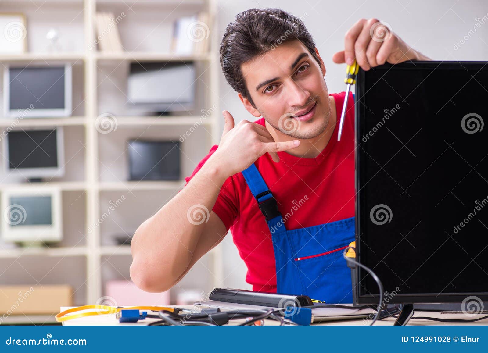The Professional Repair Engineer Repairing Broken Tv Stock Photo ...