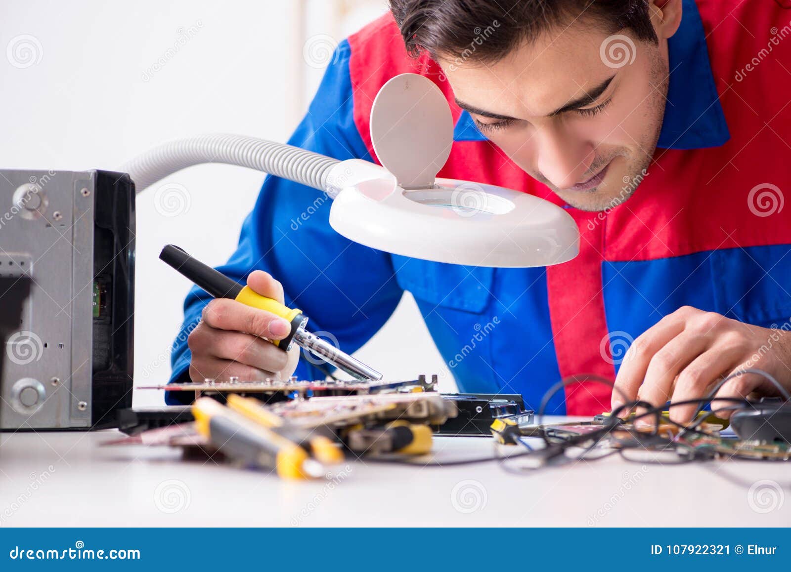 The Professional Repairman Repairing Computer in Workshop Stock Image ...