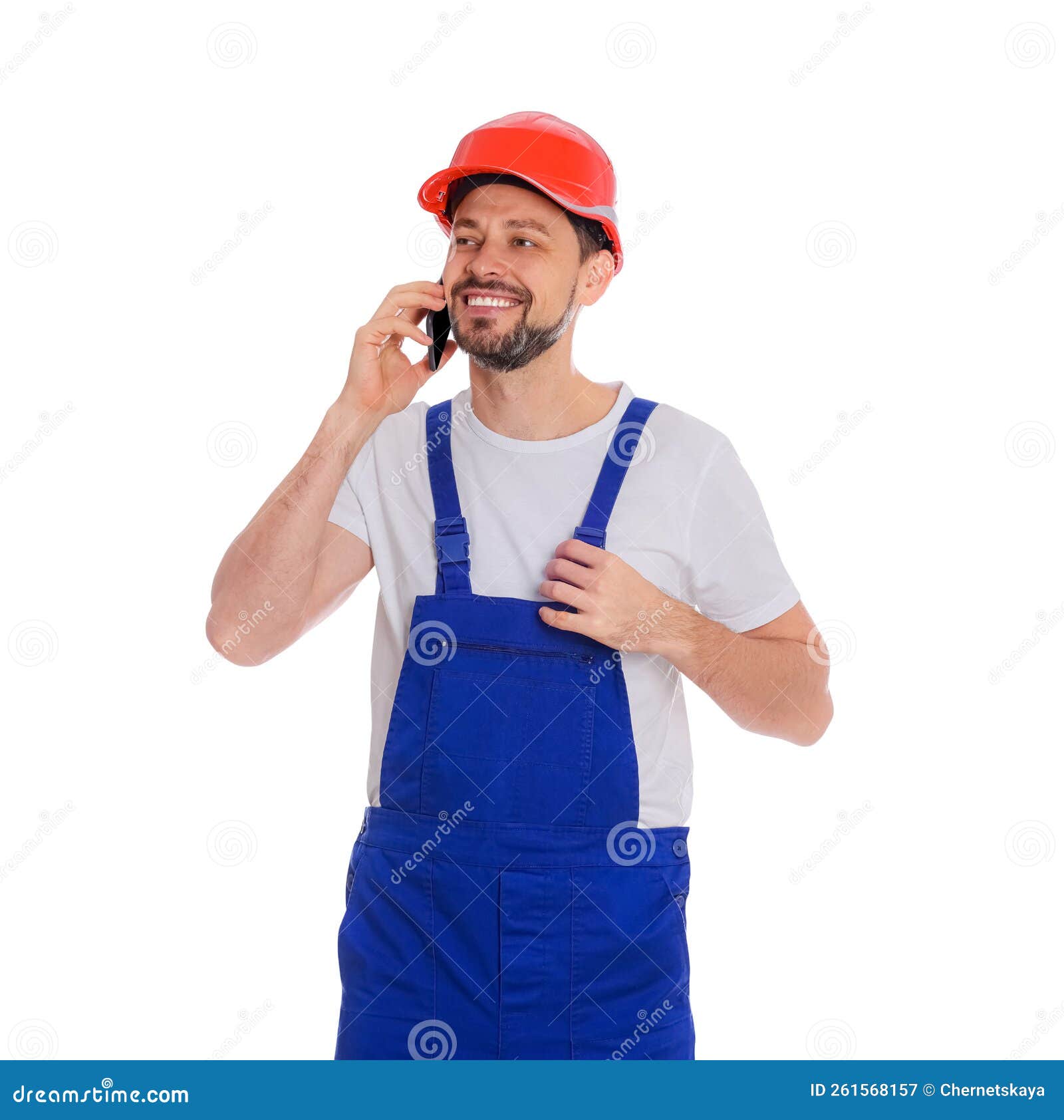 Professional Repairman in Uniform Talking on Phone Against White ...