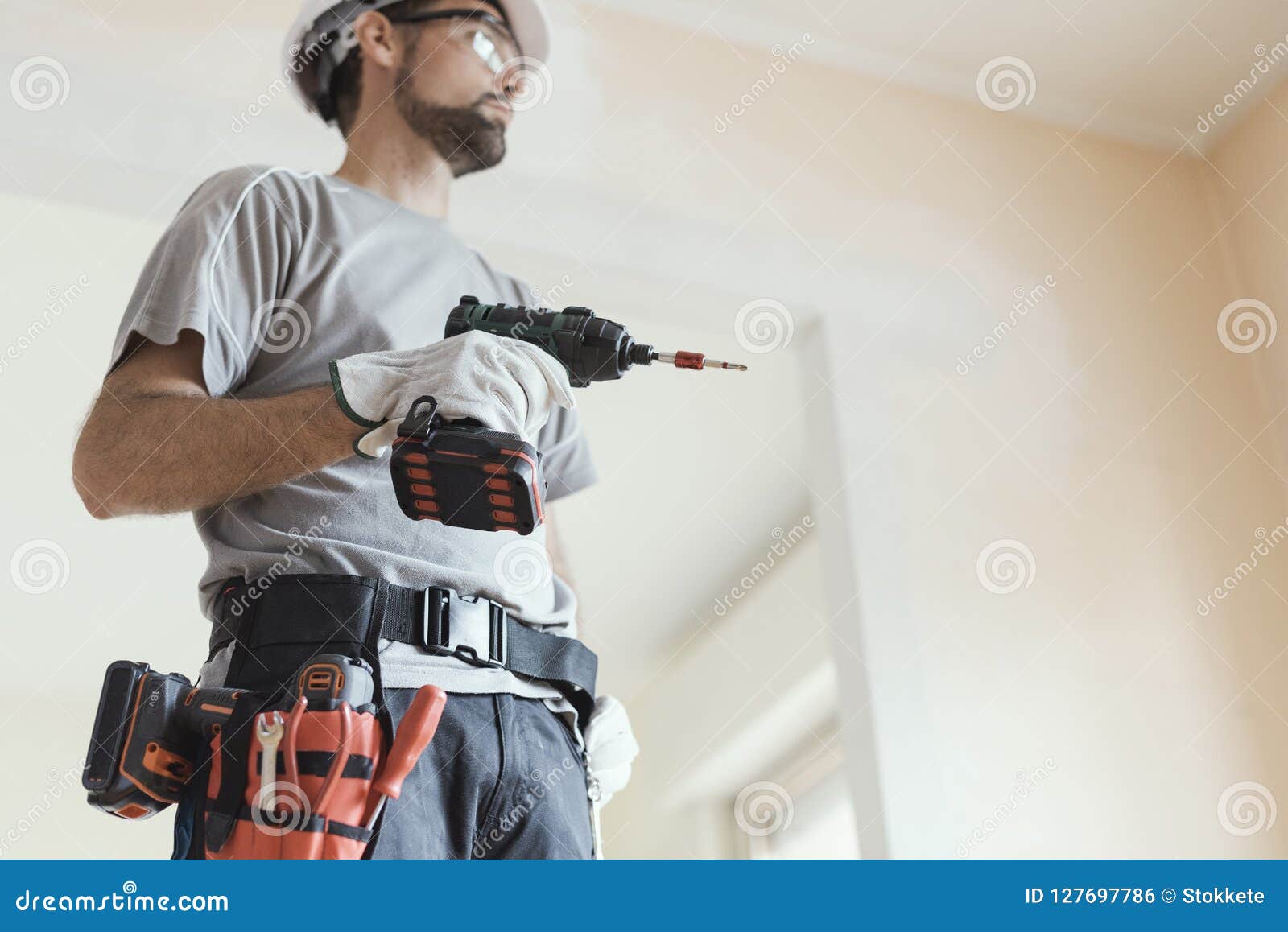 Professional Repairman Using a Drill Stock Photo - Image of tools ...