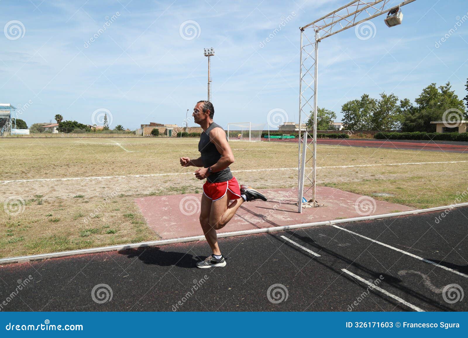Fit Runner Sprinting on the Track Stock Image - Image of healthy, legs ...
