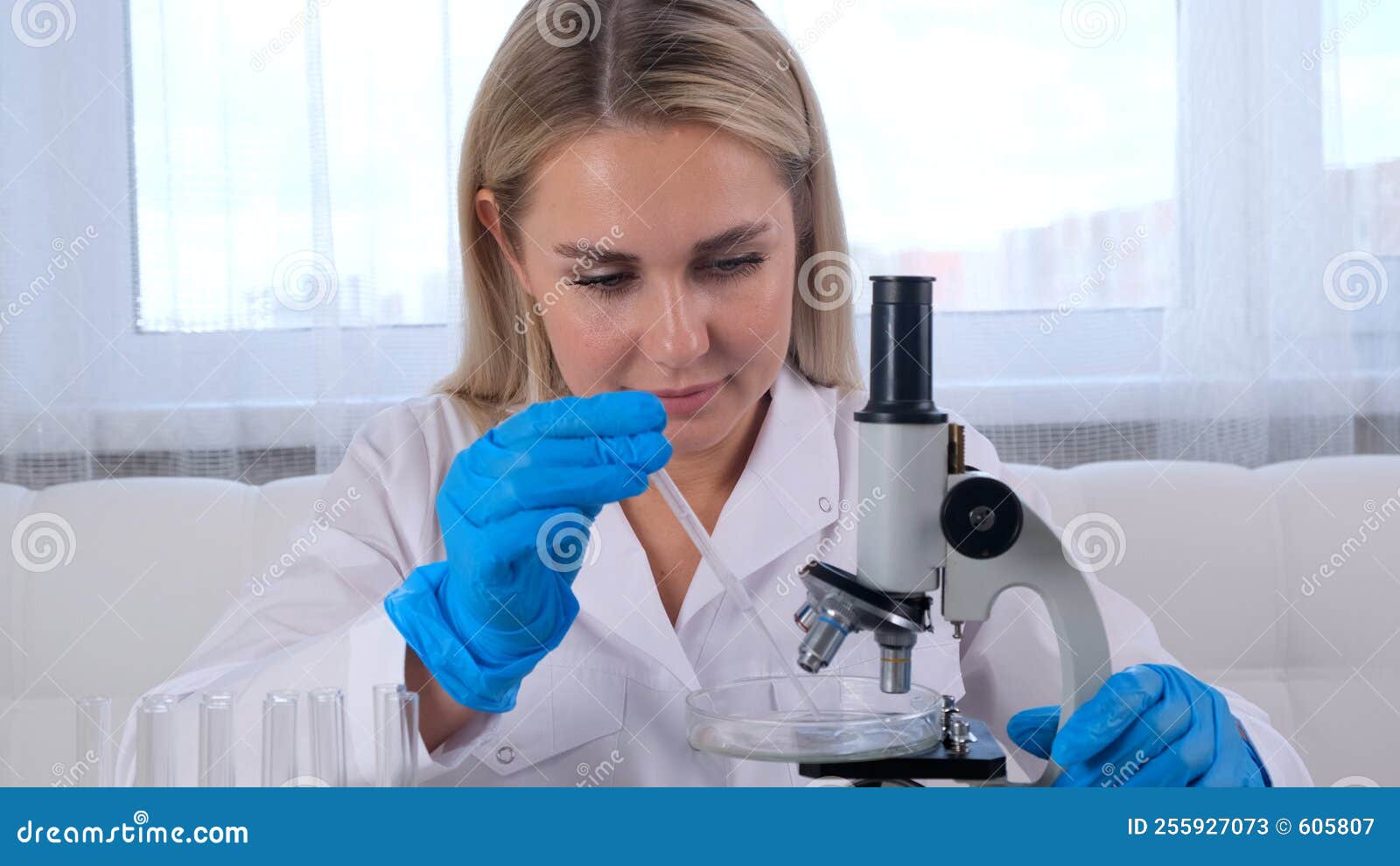 Professional Scientist Takes a Sample for a Medical Experiment. a ... Professional Scientist Takes a Sample for a Medical Experiment. a ...