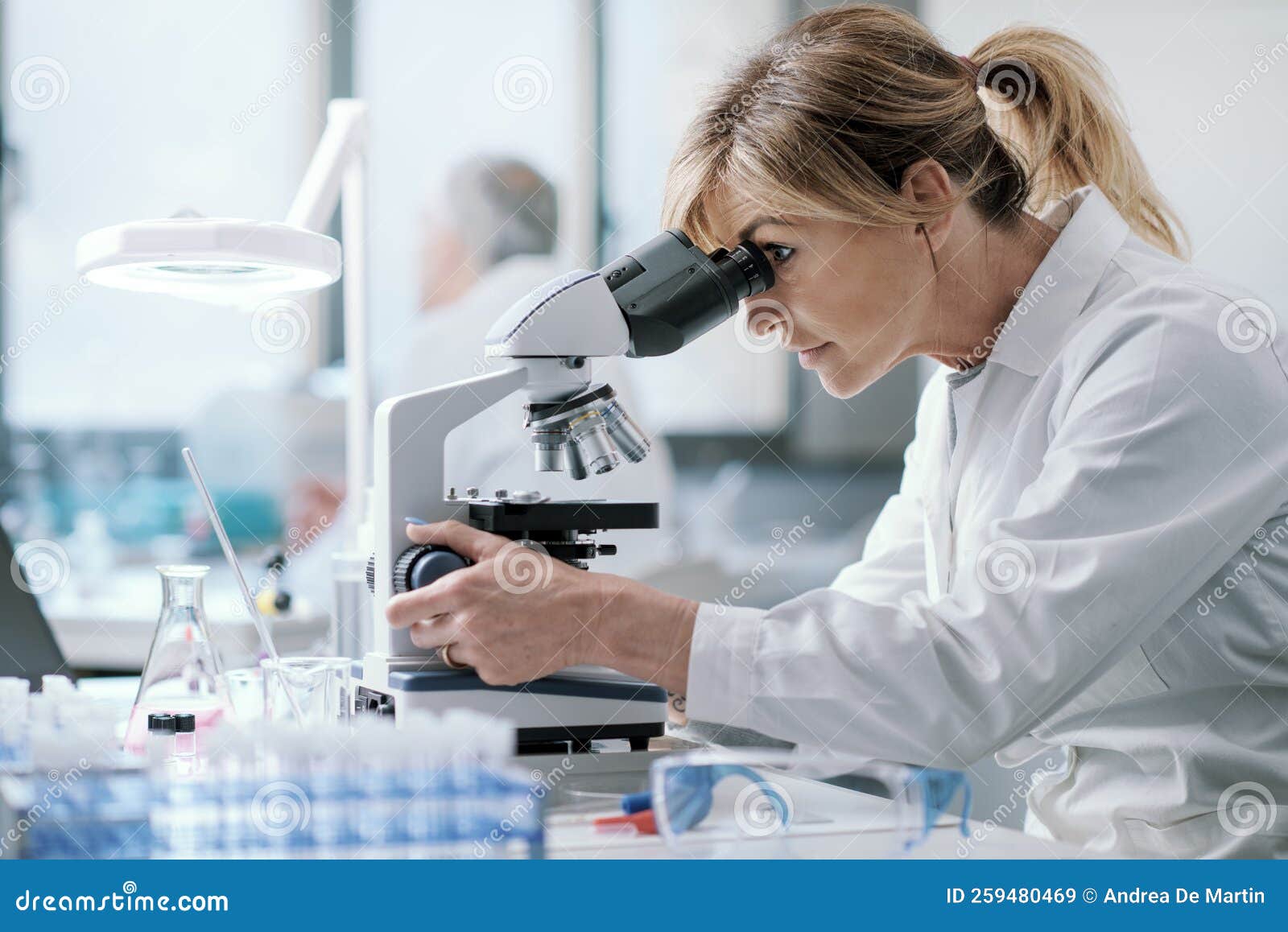 Professional Scientist Using a Microscope Stock Image - Image of ...