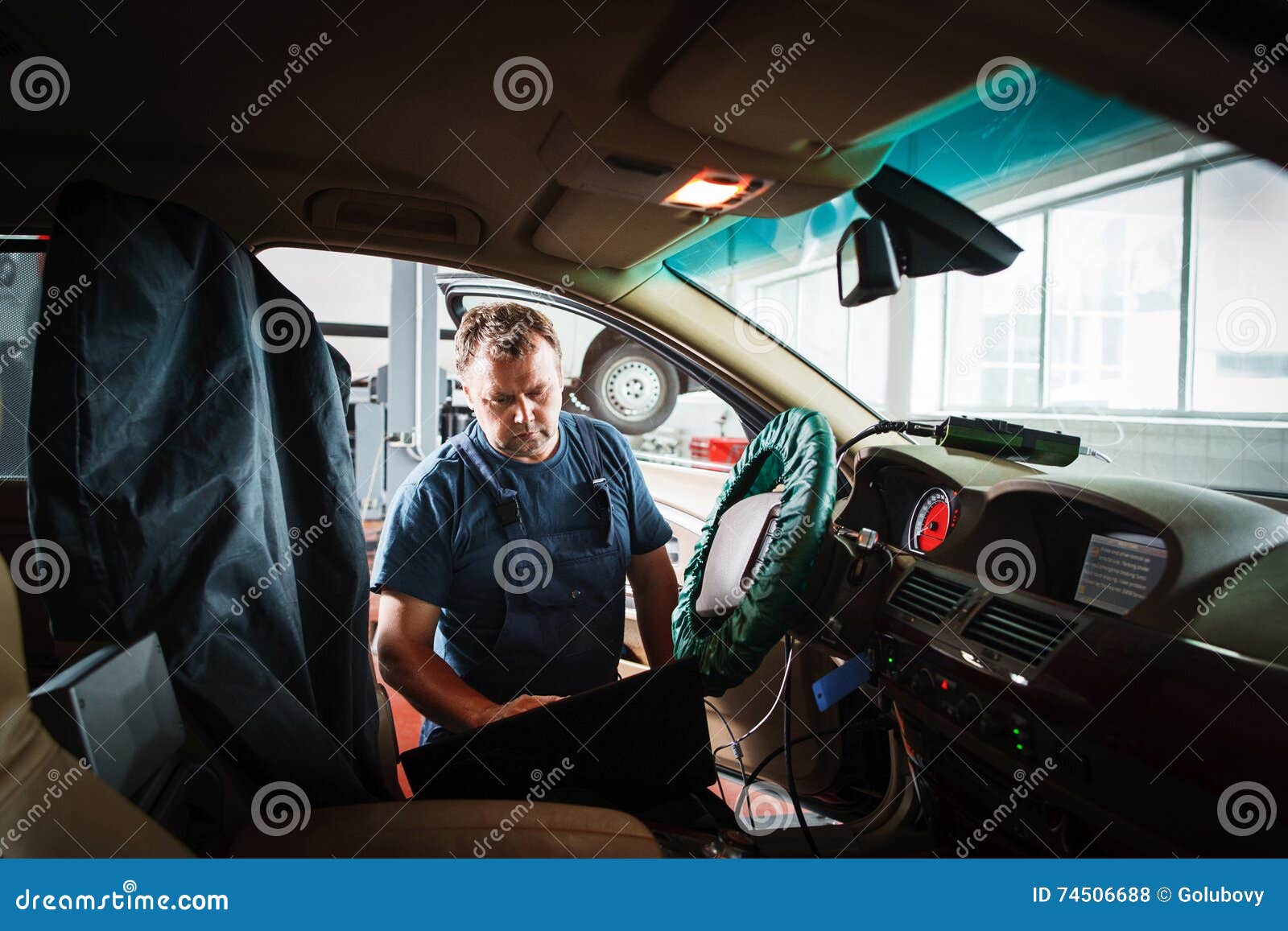Professional Serviceman Checking Car with Computer Stock Photo - Image ...