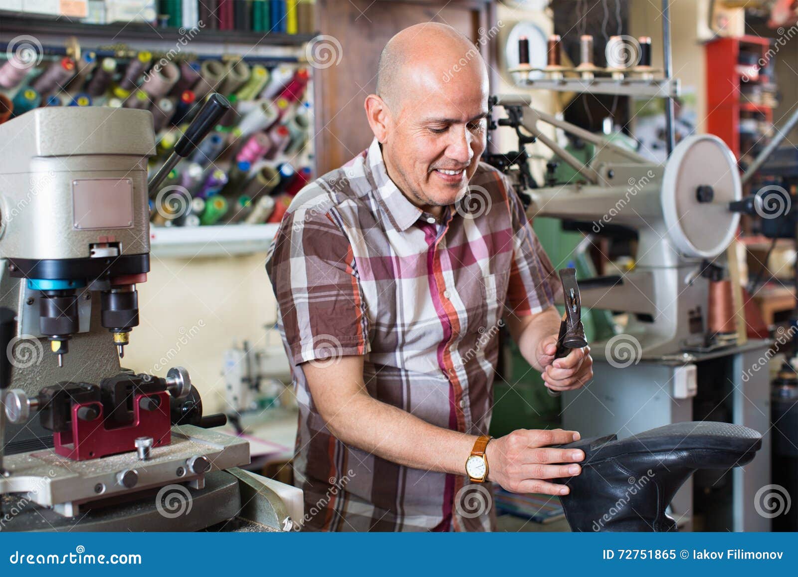 Professional Shoemaker Heeling Footwear on Machine Stock Image - Image ...