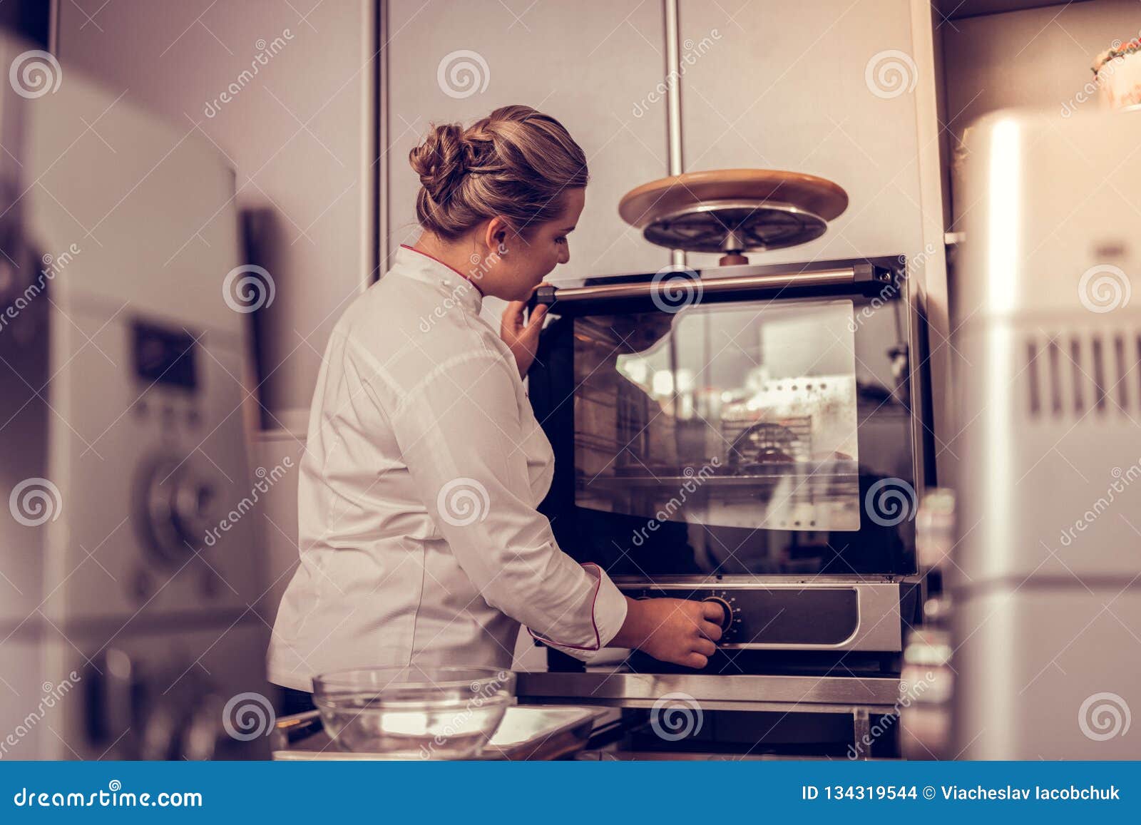 Professional Skilled Cook Turning on the Oven Stock Photo - Image of ...