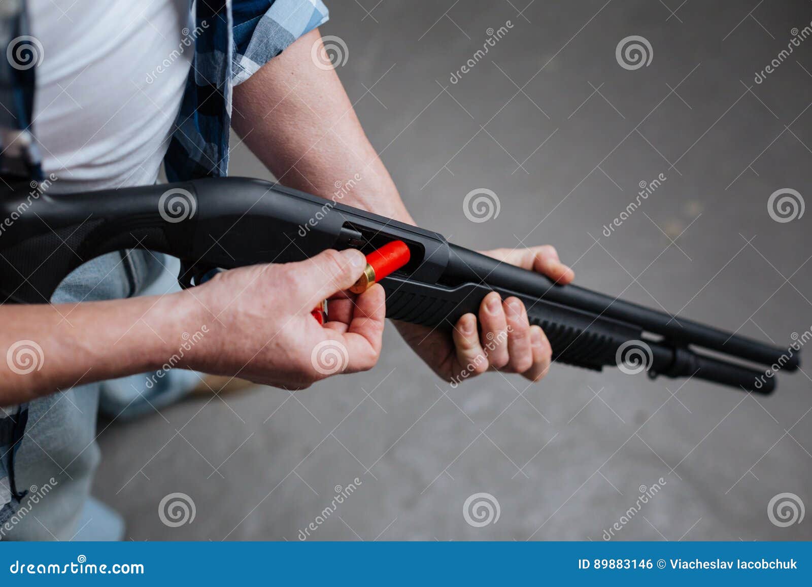Professional Skilled Marksman Loading His Gun Stock Photo - Image of ...