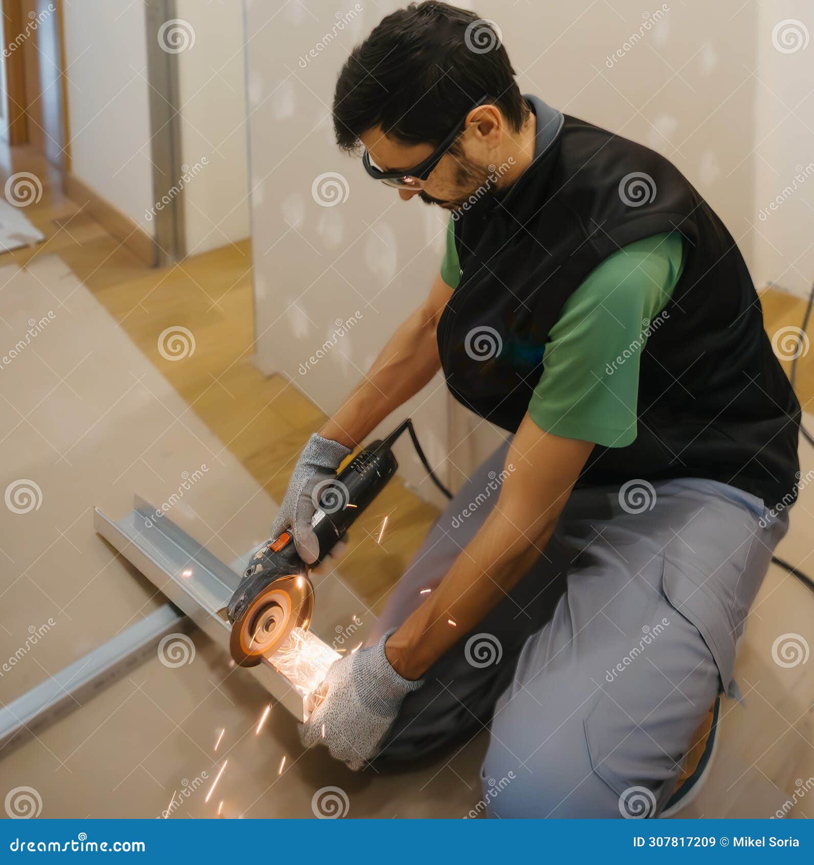 Professional Skilled Worker Cutting a Profile with a Grinder at an ...