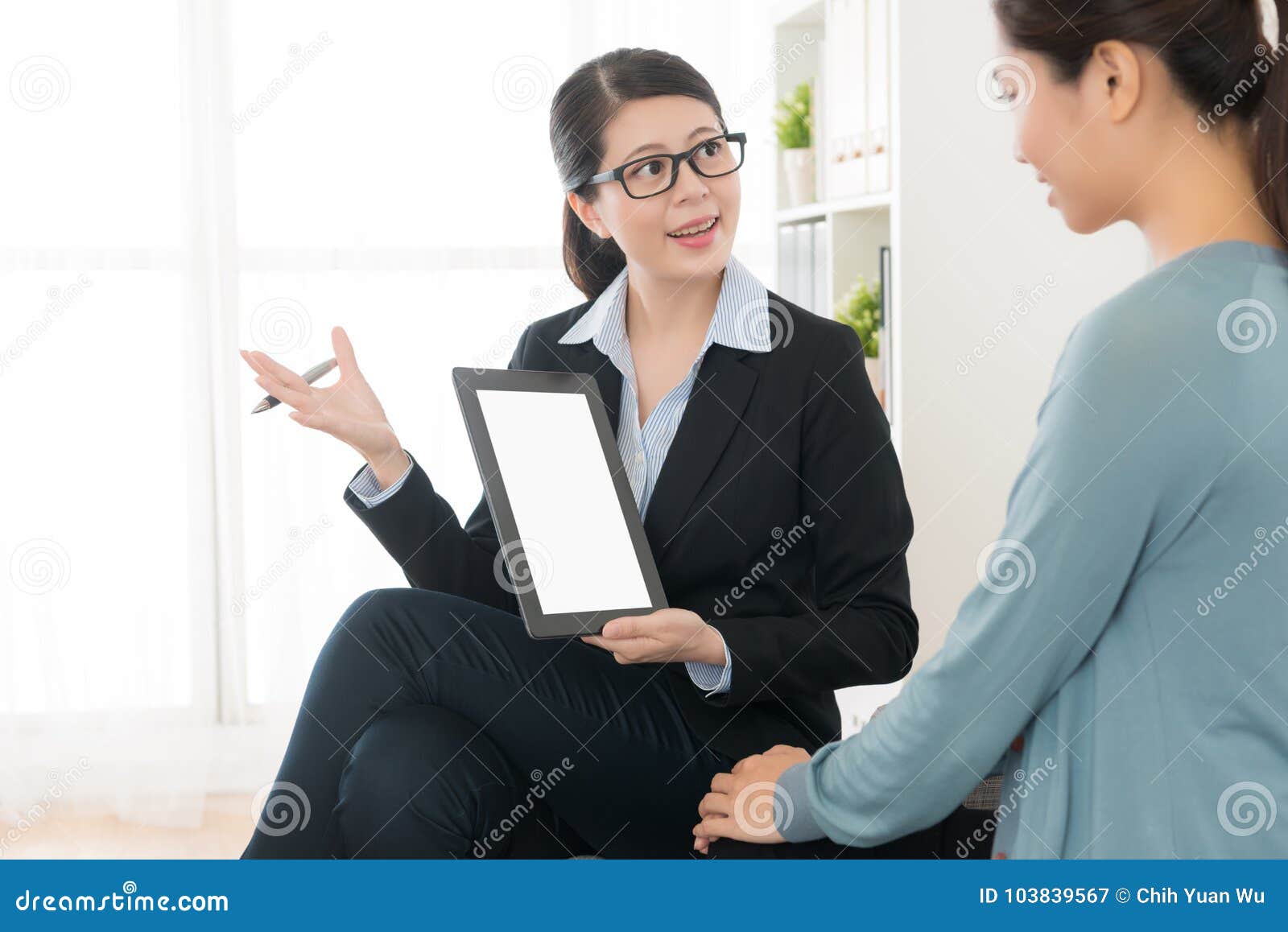 Professional Insurance Agent Looking at Her Client Stock Image - Image ...