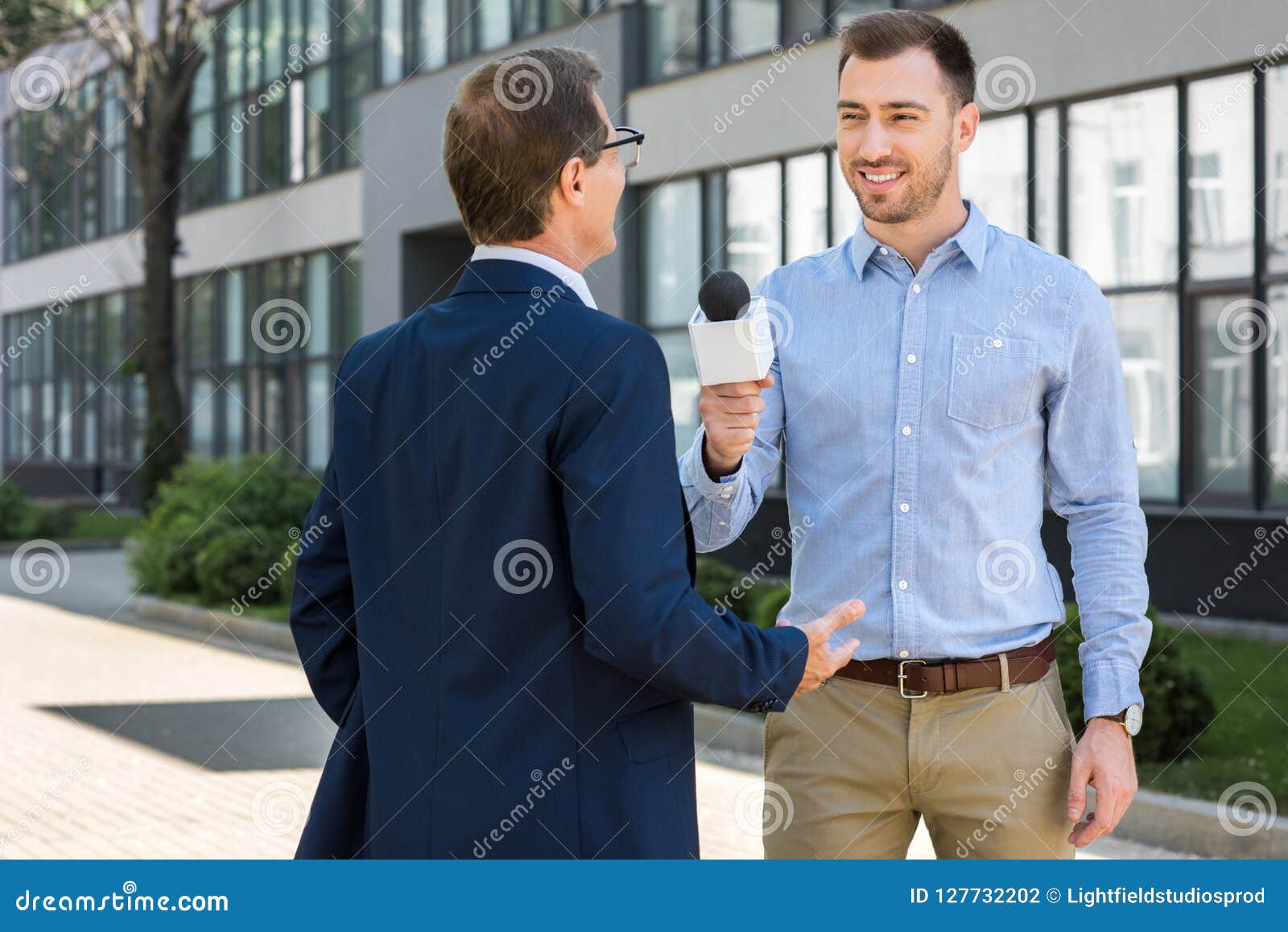 Professional Smiling Journalist Interviewing Successful Mature ...