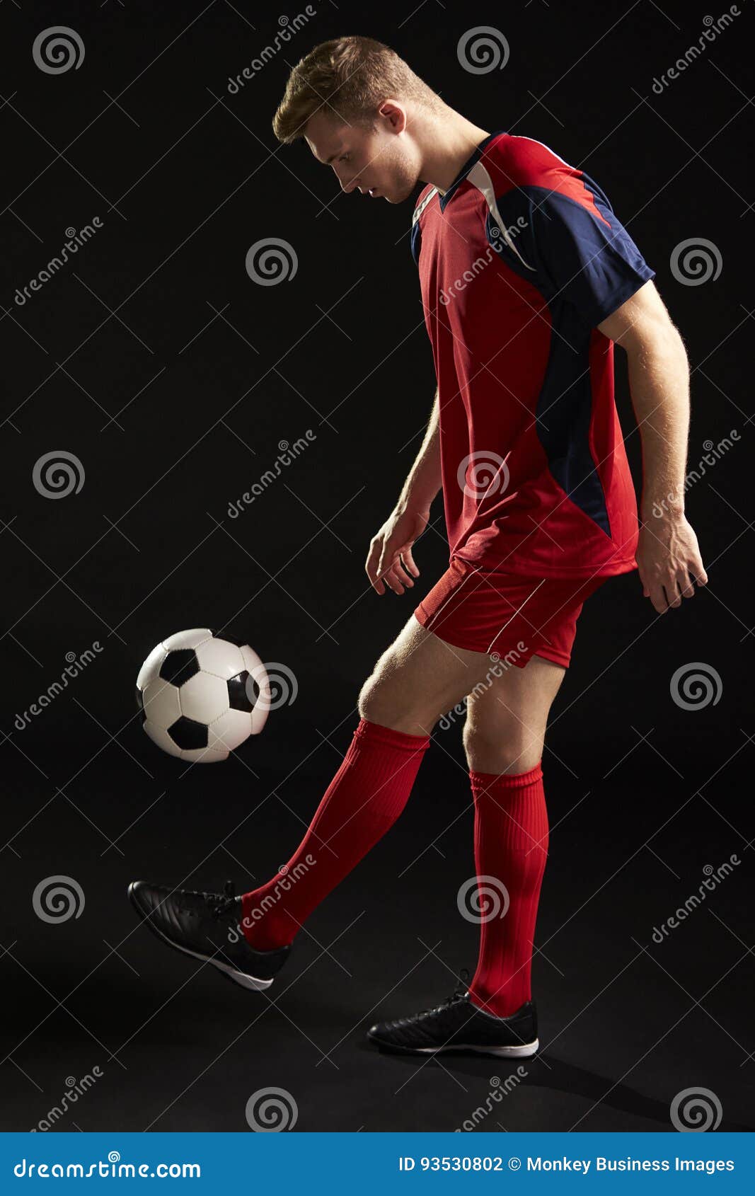 Professional Soccer Player Controlling Ball in Studio Stock Photo ...