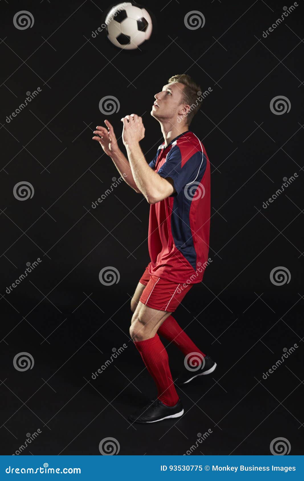 Professional Soccer Player Heading Ball in Studio Stock Image - Image ...