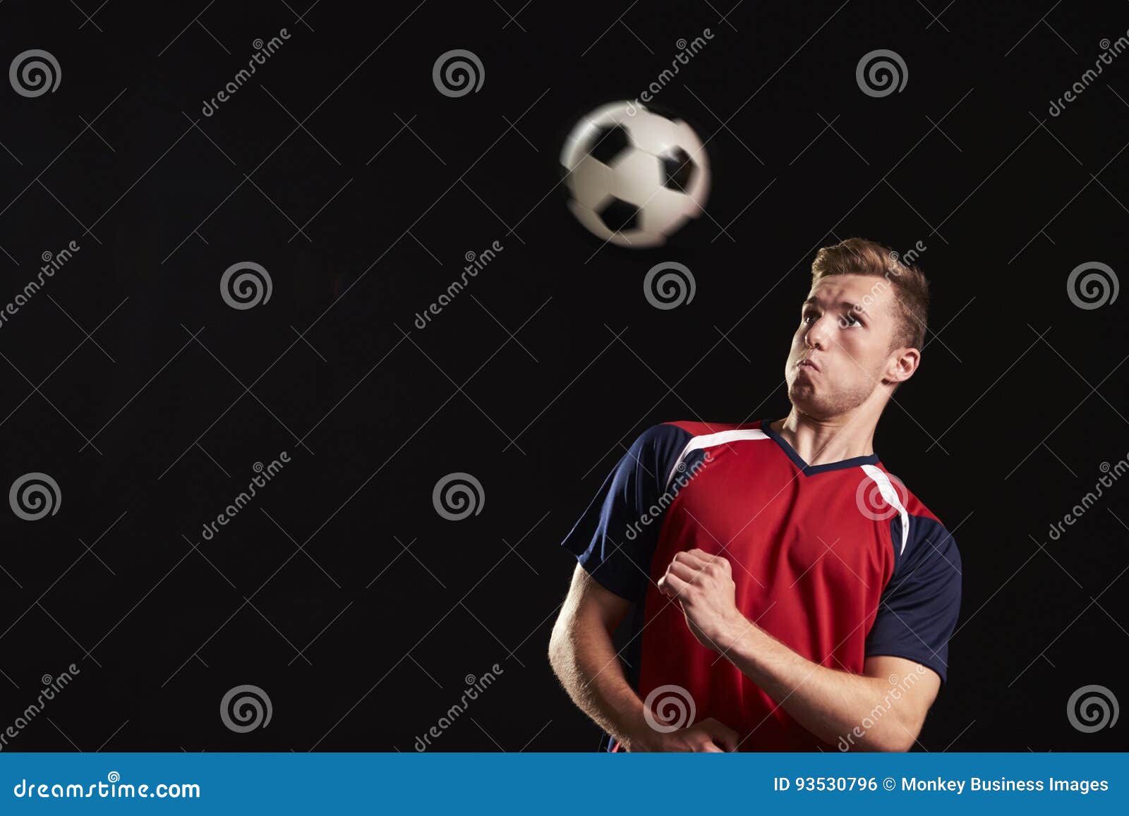 Professional Soccer Player Heading Ball in Studio Stock Photo - Image ...