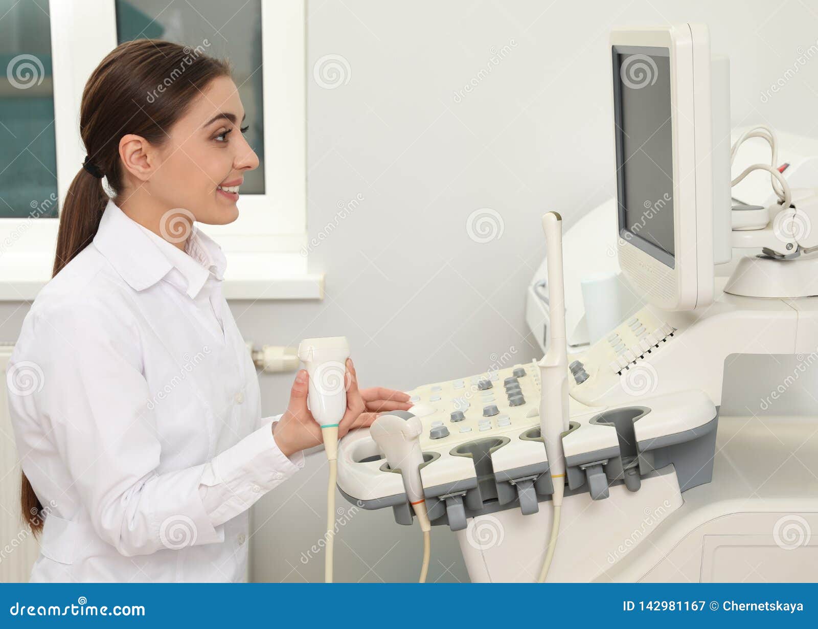 Professional Sonographer Using Modern Ultrasound Machine Royalty-Free ...