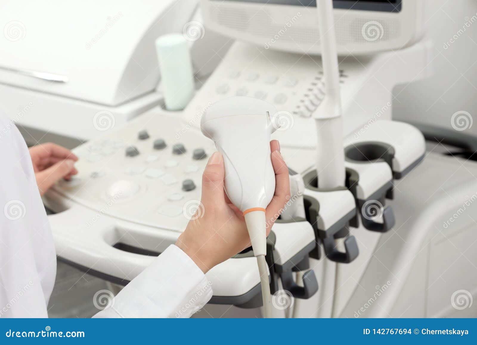 Professional Sonographer Using Modern Ultrasound Machine in Clinic ...