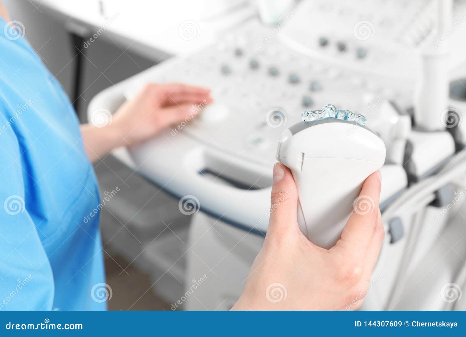 Professional Sonographer Using Modern Ultrasound Machine in Clinic ...
