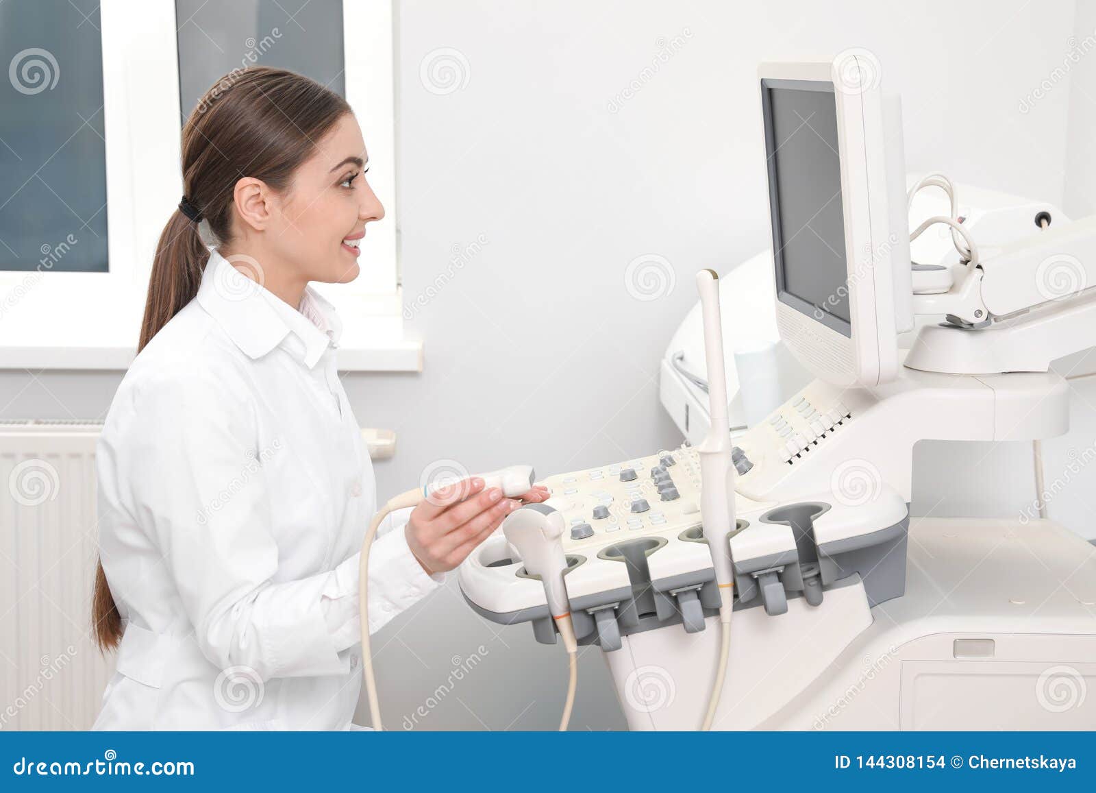 Professional Sonographer Using Modern Ultrasound Machine Stock Photo ...