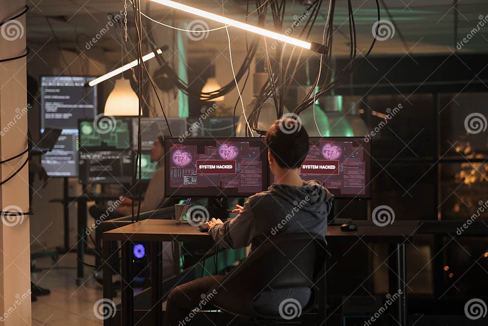 Professional Spy Breaking into Computer System and Hacking Bank Account ...