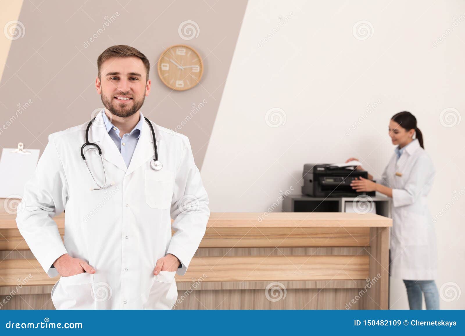 Professional Staff Working at Reception Stock Image - Image of male ...