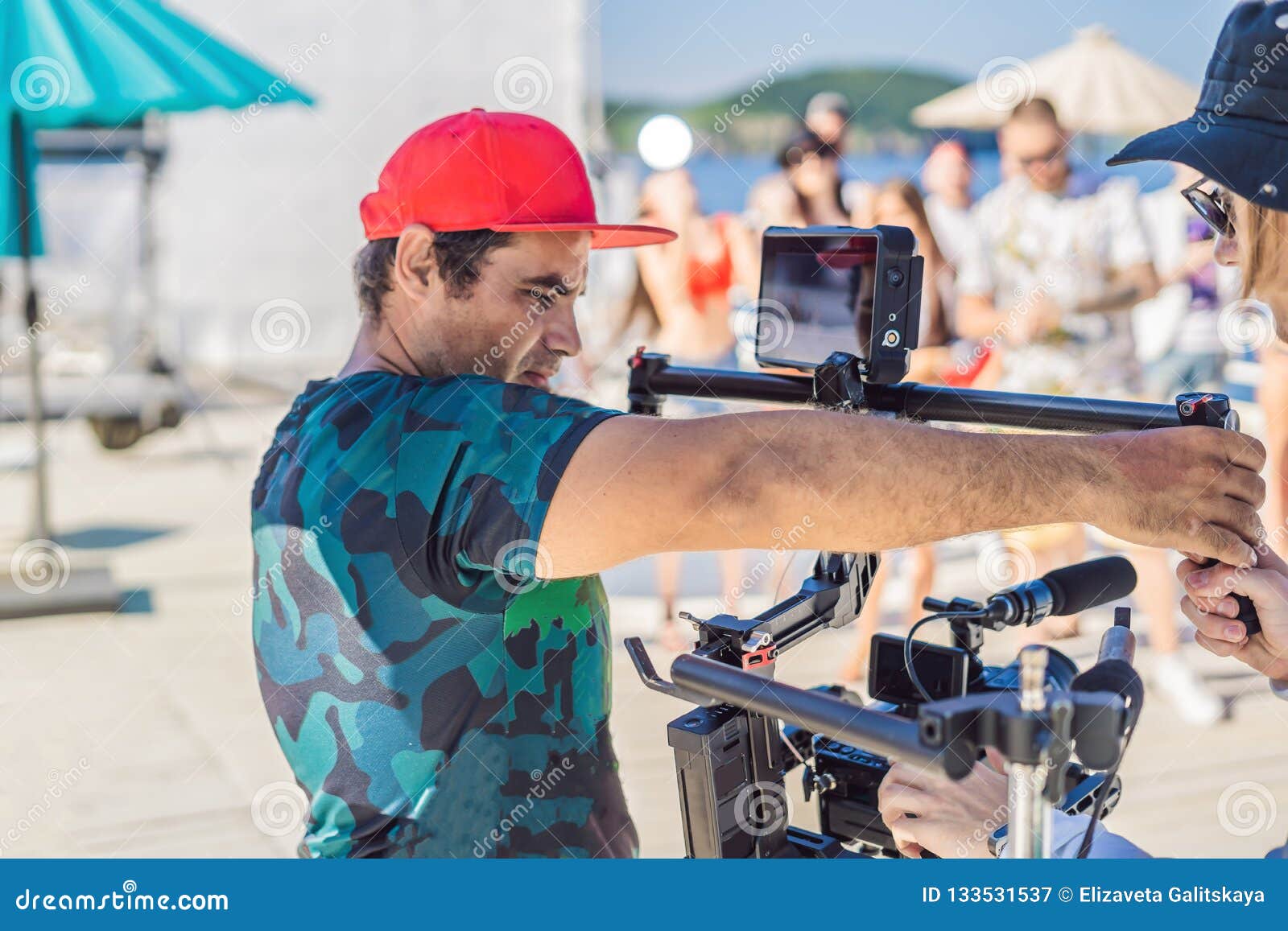 Professional Steadicam Operator Uses a 3-axis Camera Stabilizer System ...