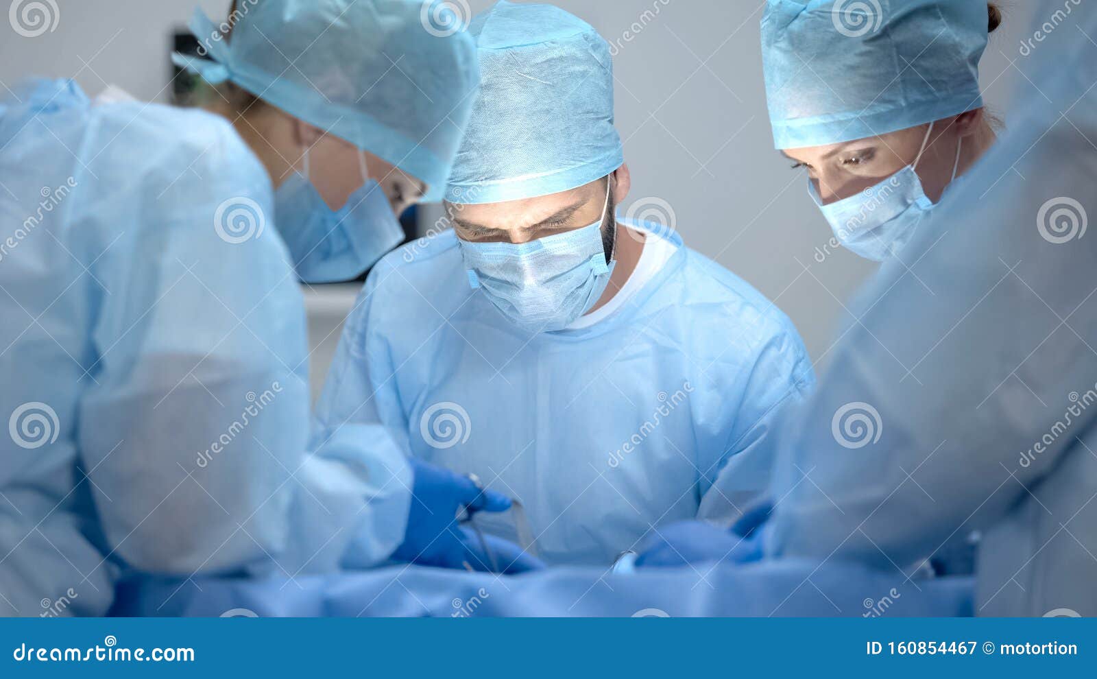 Professional Surgeon and Assistants Performing Difficult Operation ...