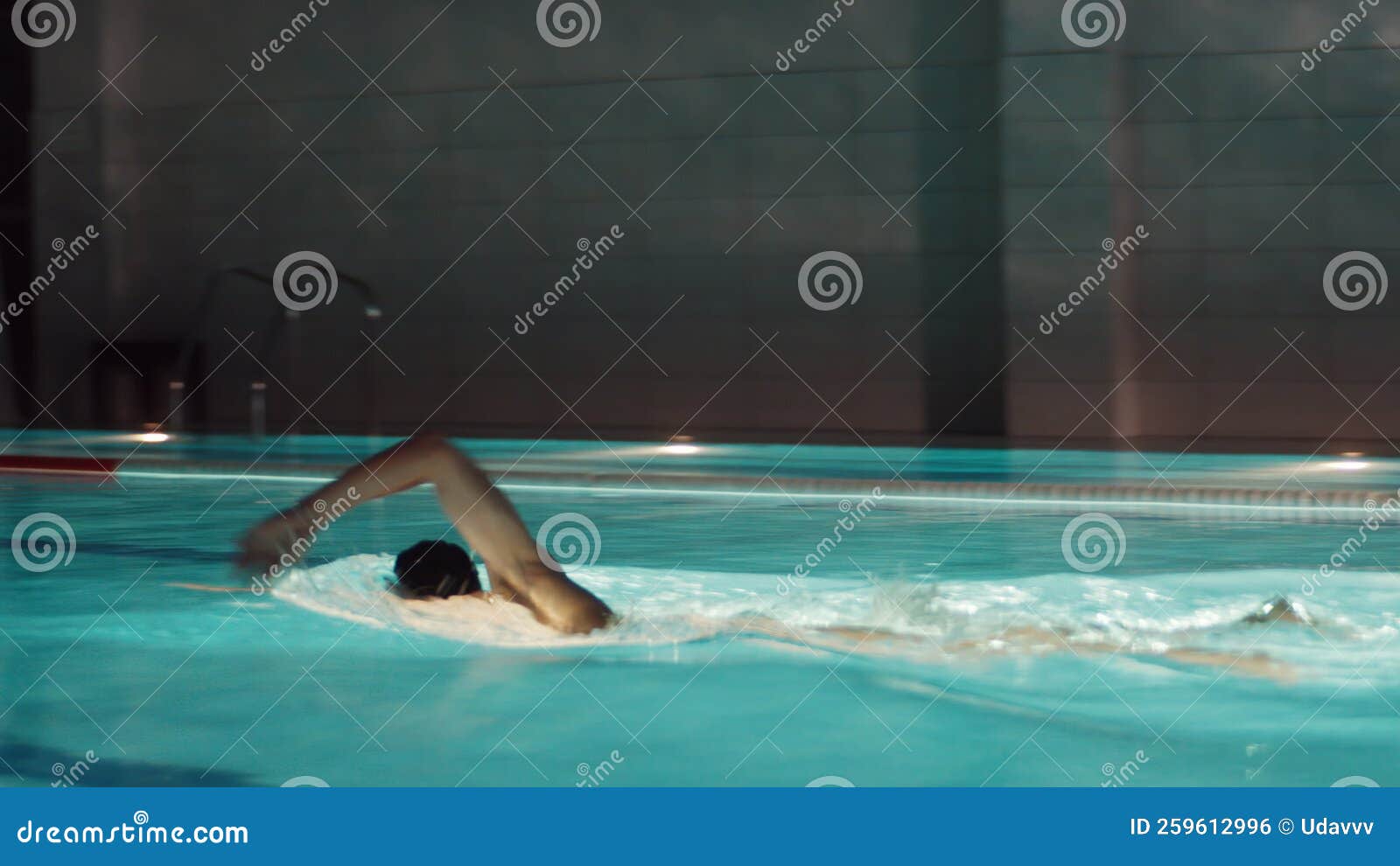 Professional Swimmer Man Dives into the Water in the Pool Stock Footage ...