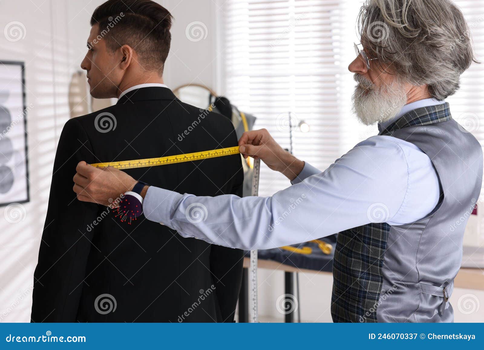 Professional Tailor Measuring Client`s Back Width Stock Image - Image ...