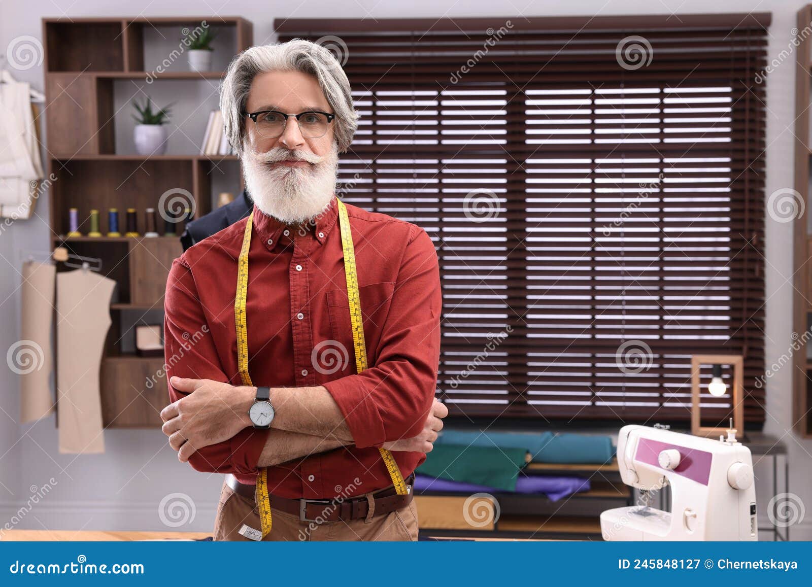 Professional Tailor with Measuring Tape in Workshop, Space for Text ...