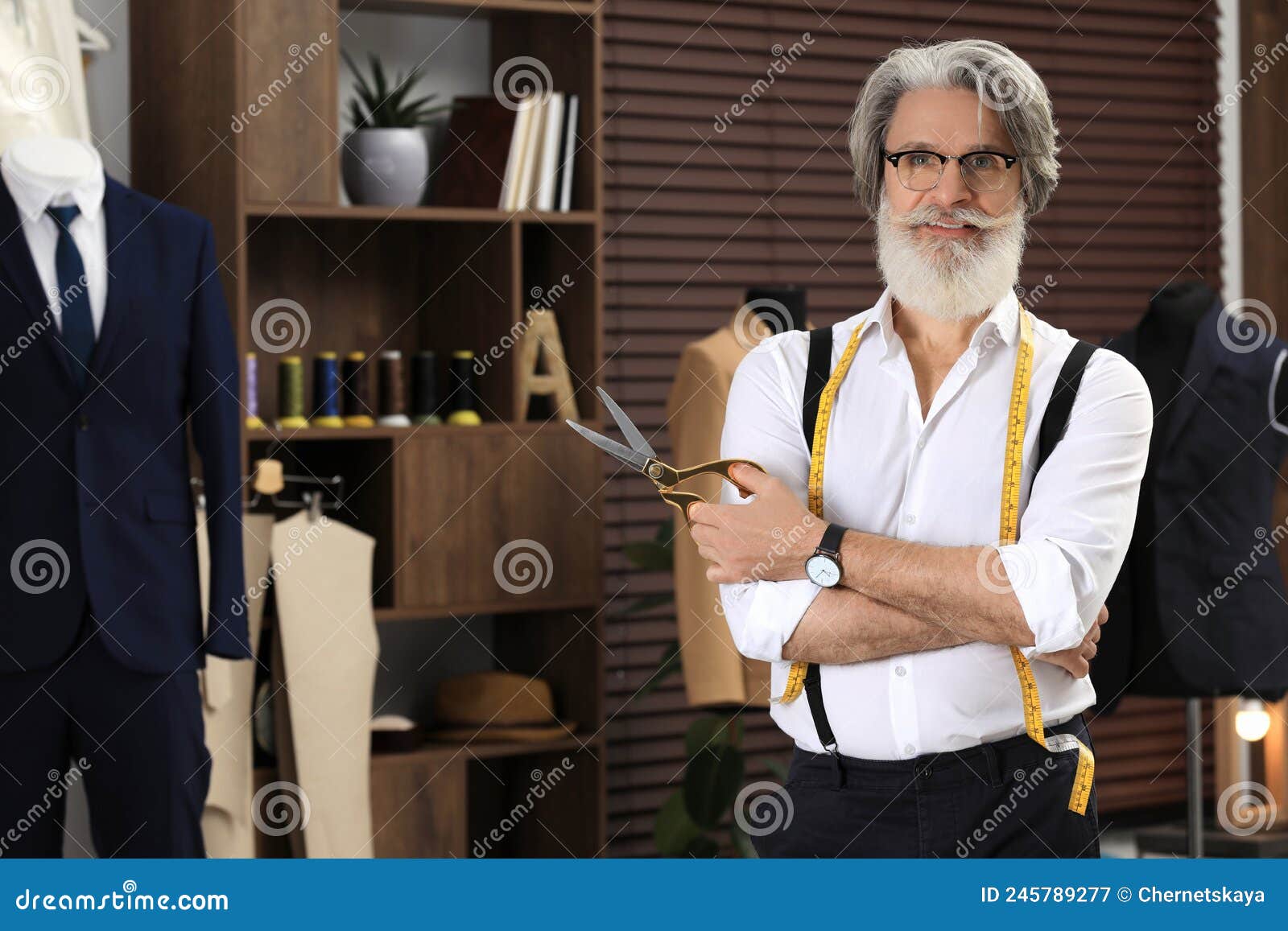 Professional Tailor with Measuring Tape in Workshop, Space for Text ...