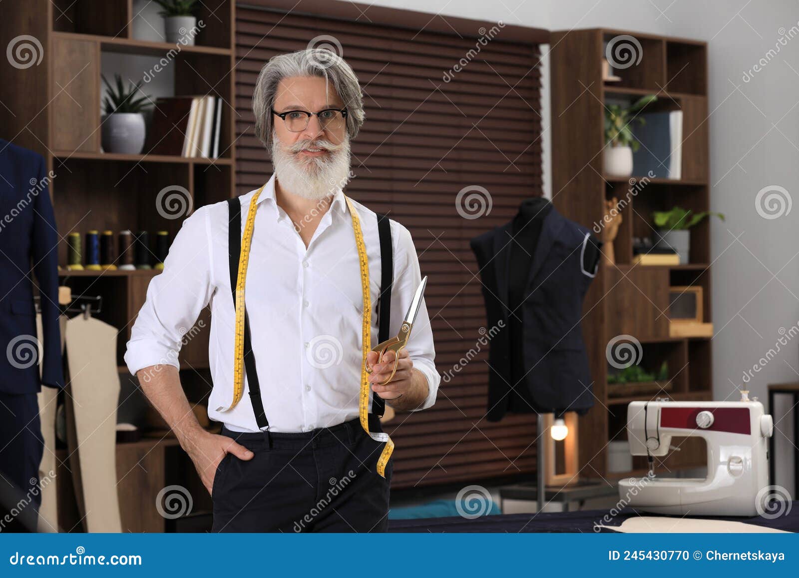 Professional Tailor with Measuring Tape in Workshop, Space for Text ...