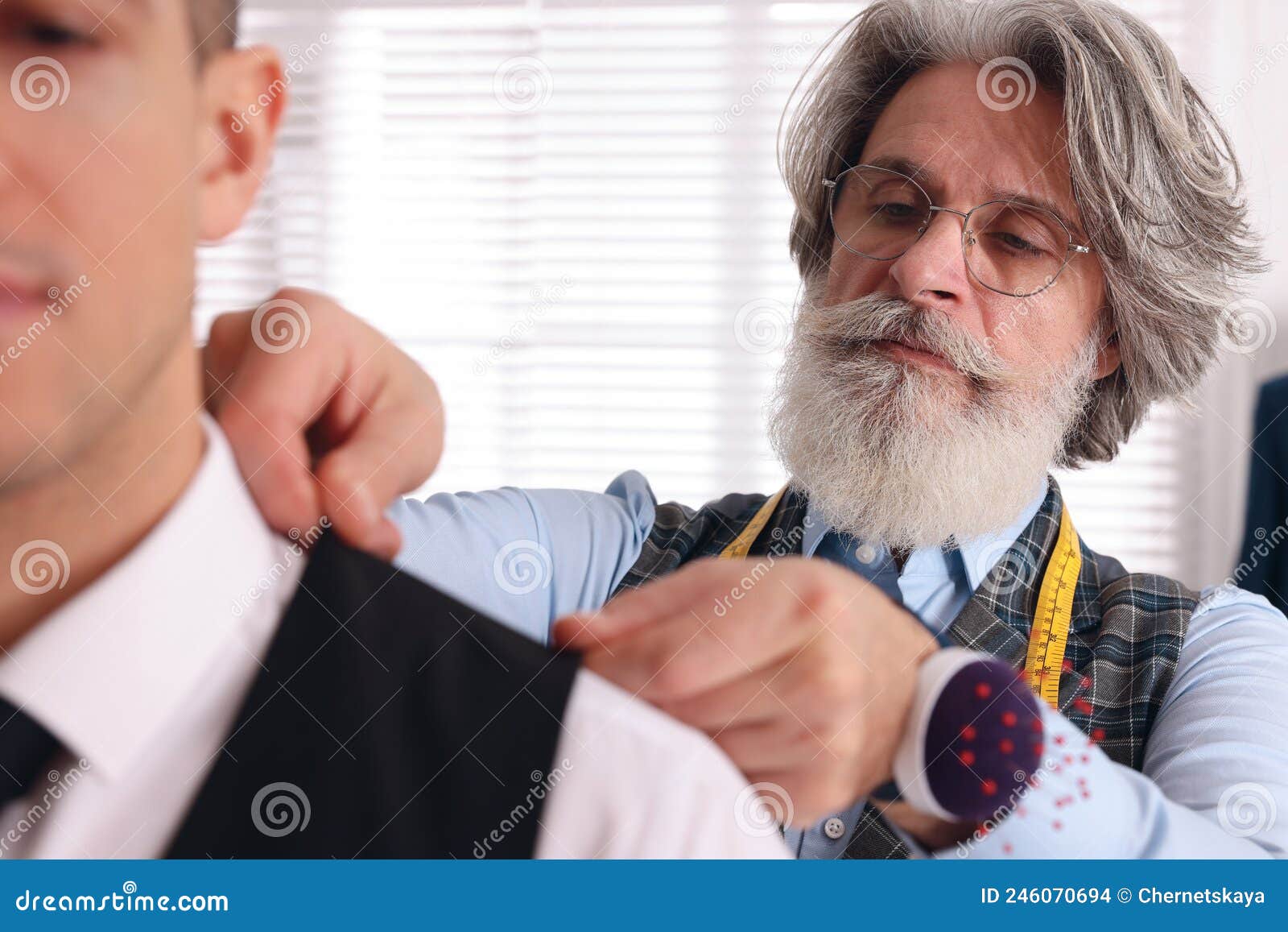 Professional Tailor Working with Client in Atelier, Closeup Stock Photo ...