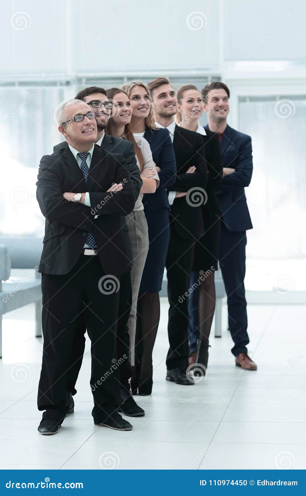 Professional Team Confidently Look Forward, Standing in the Middle of ...