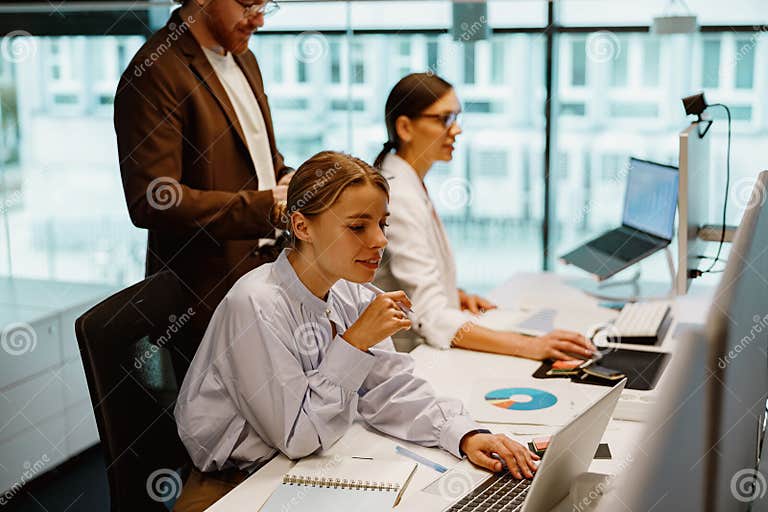 A Professional Team Engaging in Collaborative Work within a Modern ...