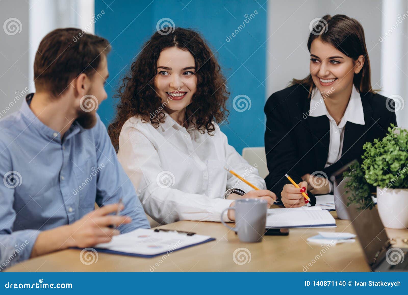 Professional Team. Happy Creative Young People Working in Team while ...