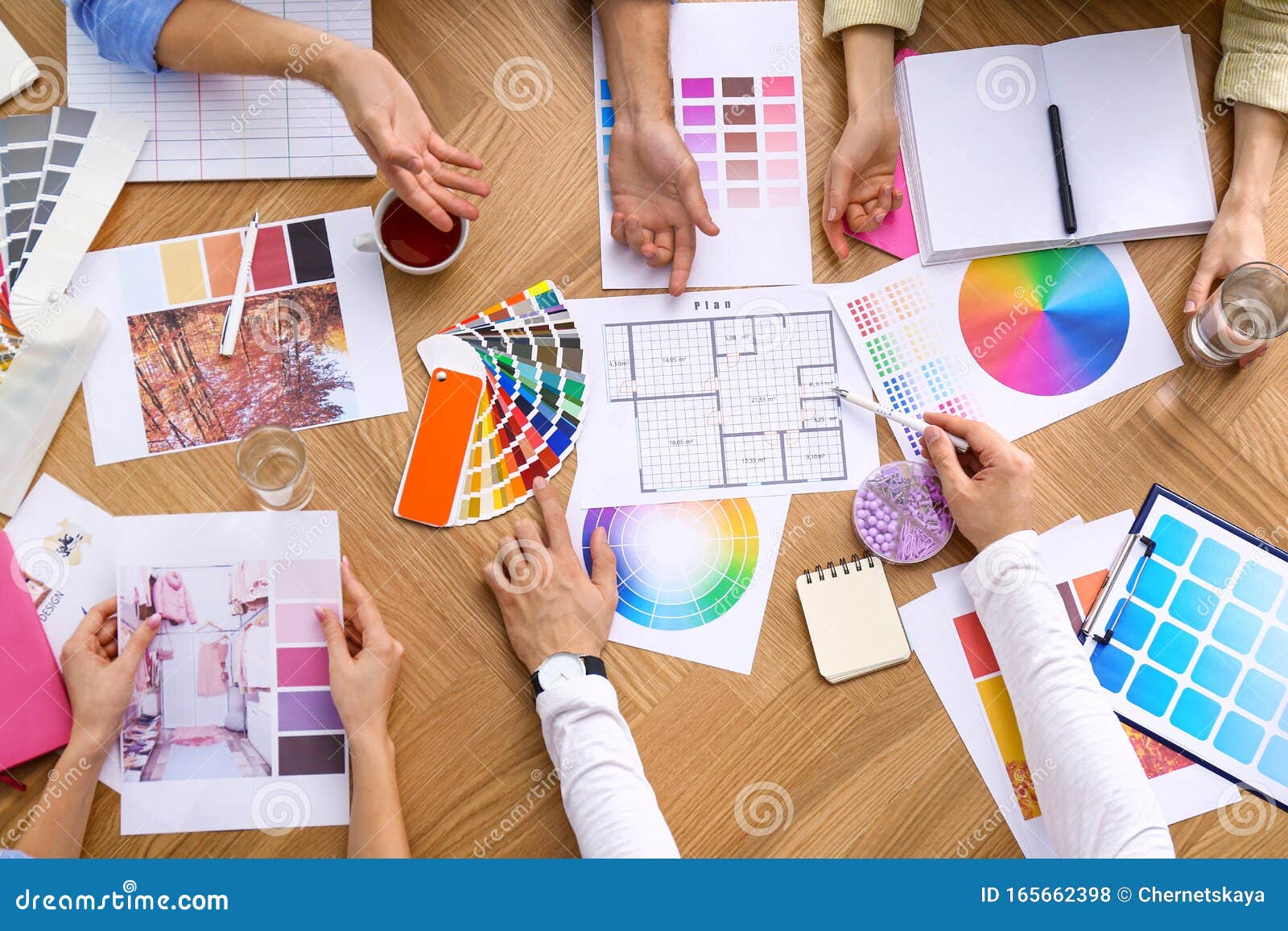 Professional Team of Interior Designers Working at Table Stock Photo ...