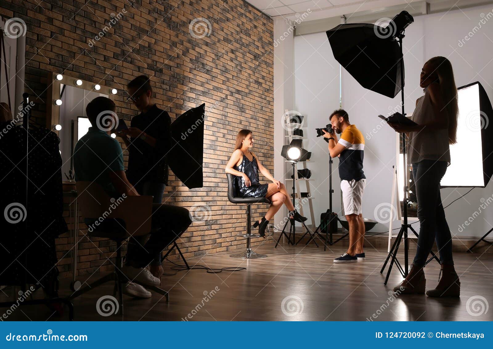 Professional Team Working with Model Stock Photo - Image of production ...
