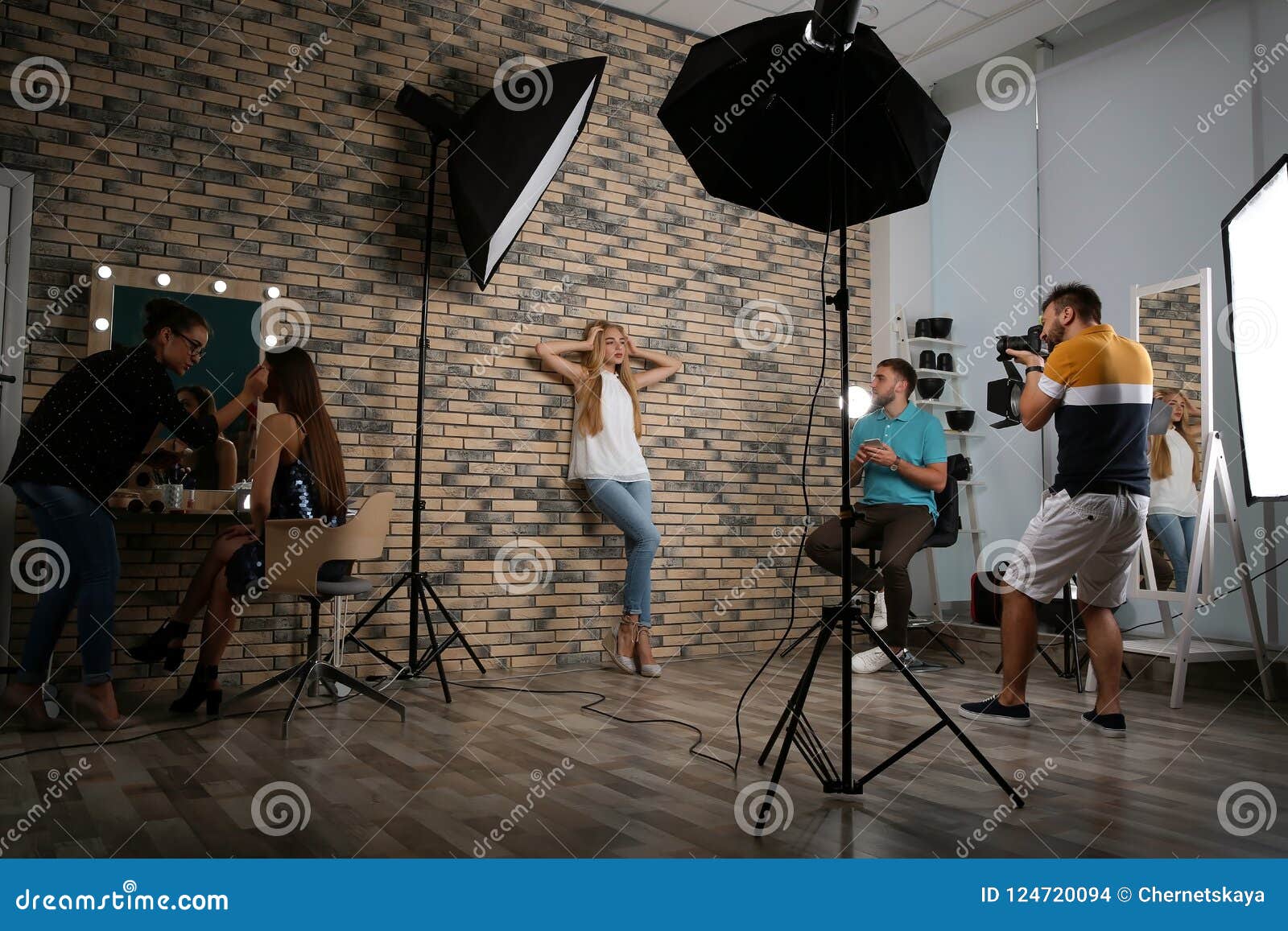 Professional Team Working with Model Stock Photo - Image of production ...
