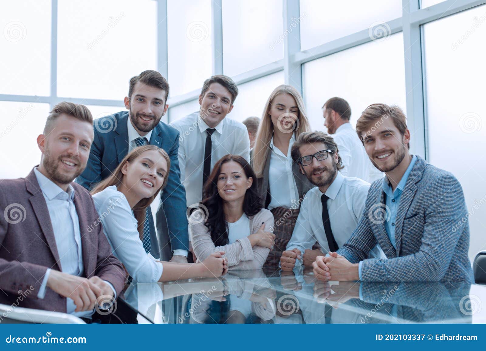 Professional Team of Young Business People Sitting at the Table. Stock ...