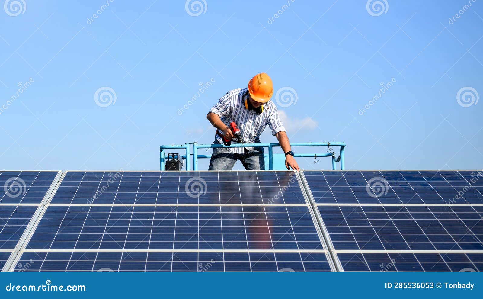 Professional Technician Worker Installing Solar Panels at Solar Cell ...