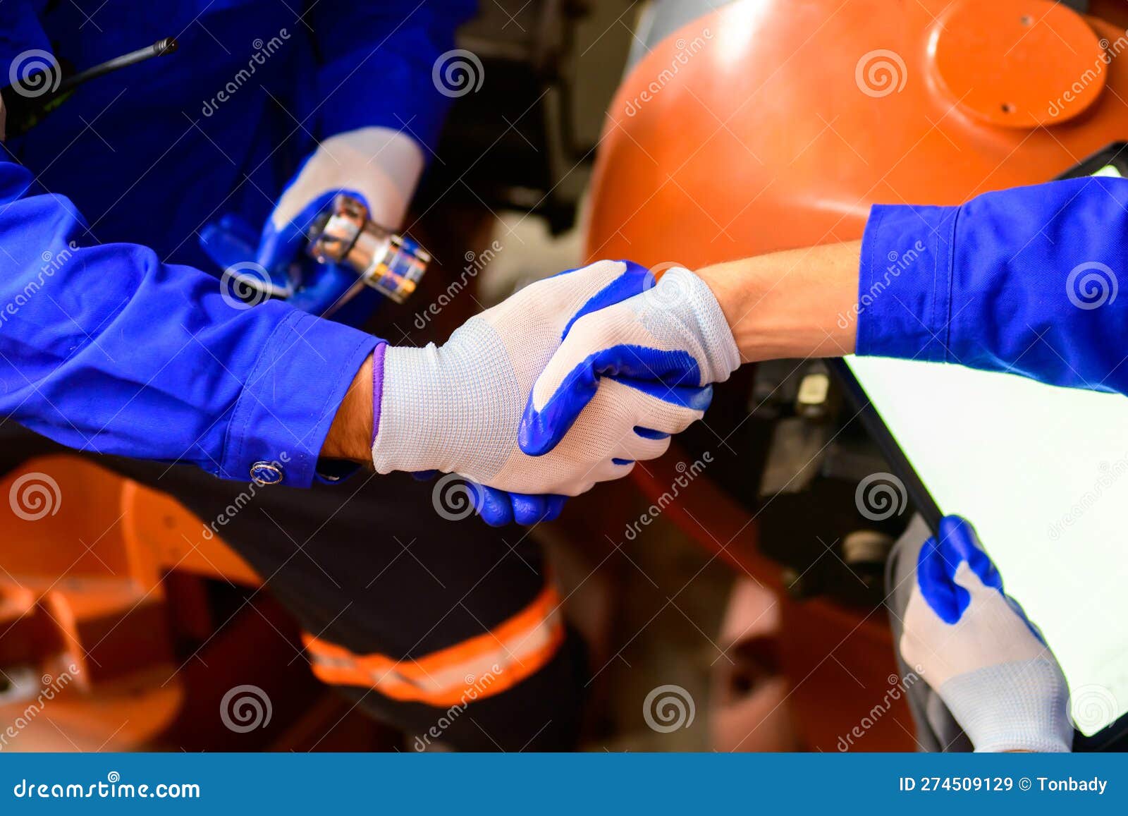 Professional Technicians Shaking Hands Together with Successful Work ...