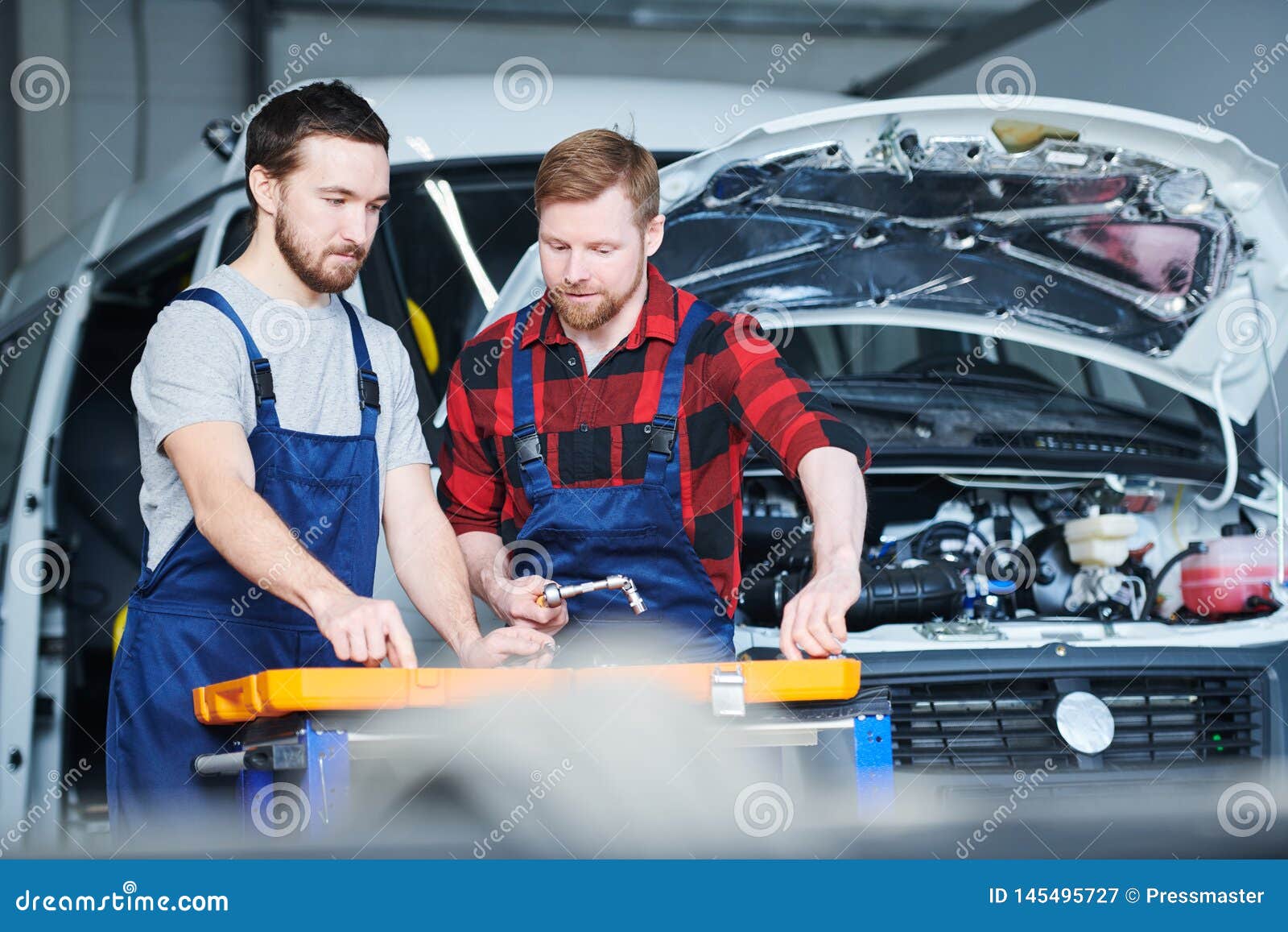 Professional technicians stock image. Image of maintenance - 145495727