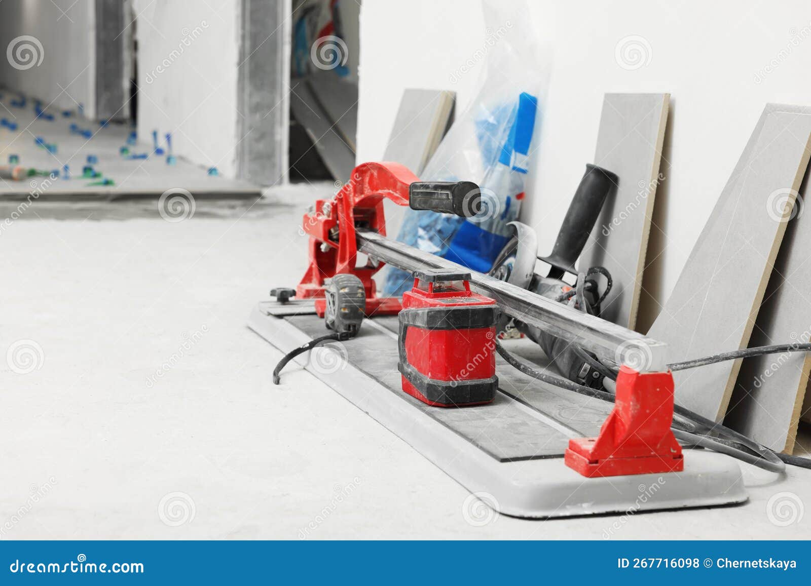 Professional Tile Setting Equipment on Floor Indoors, Space for Text ...