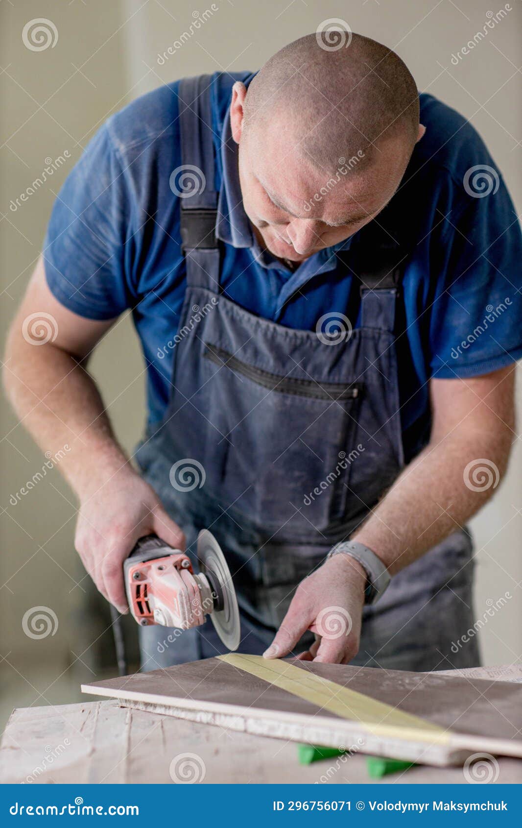 Professional Tiler Cutting Ceramic Tile for the Floor or Wall. Flooring ...