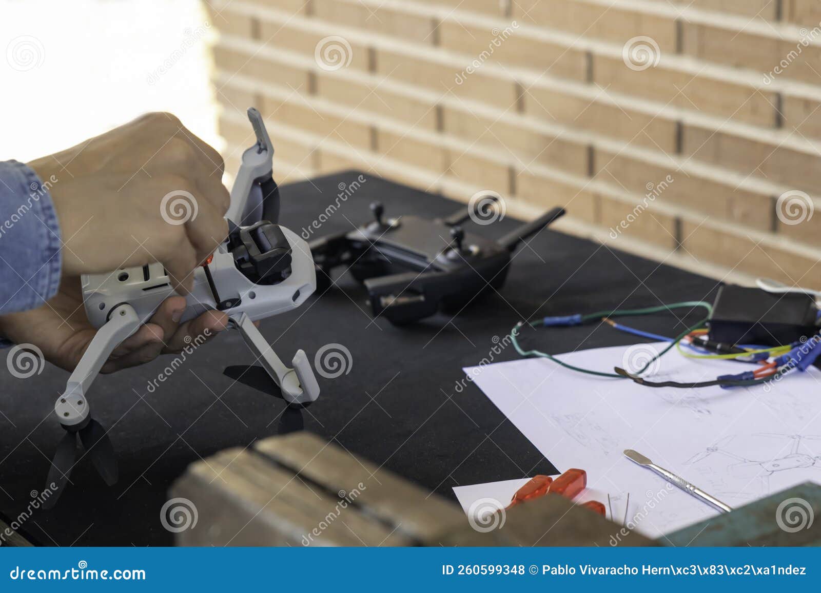 Professional Unrecognizable Mechanic Repairing Small Drone with ...