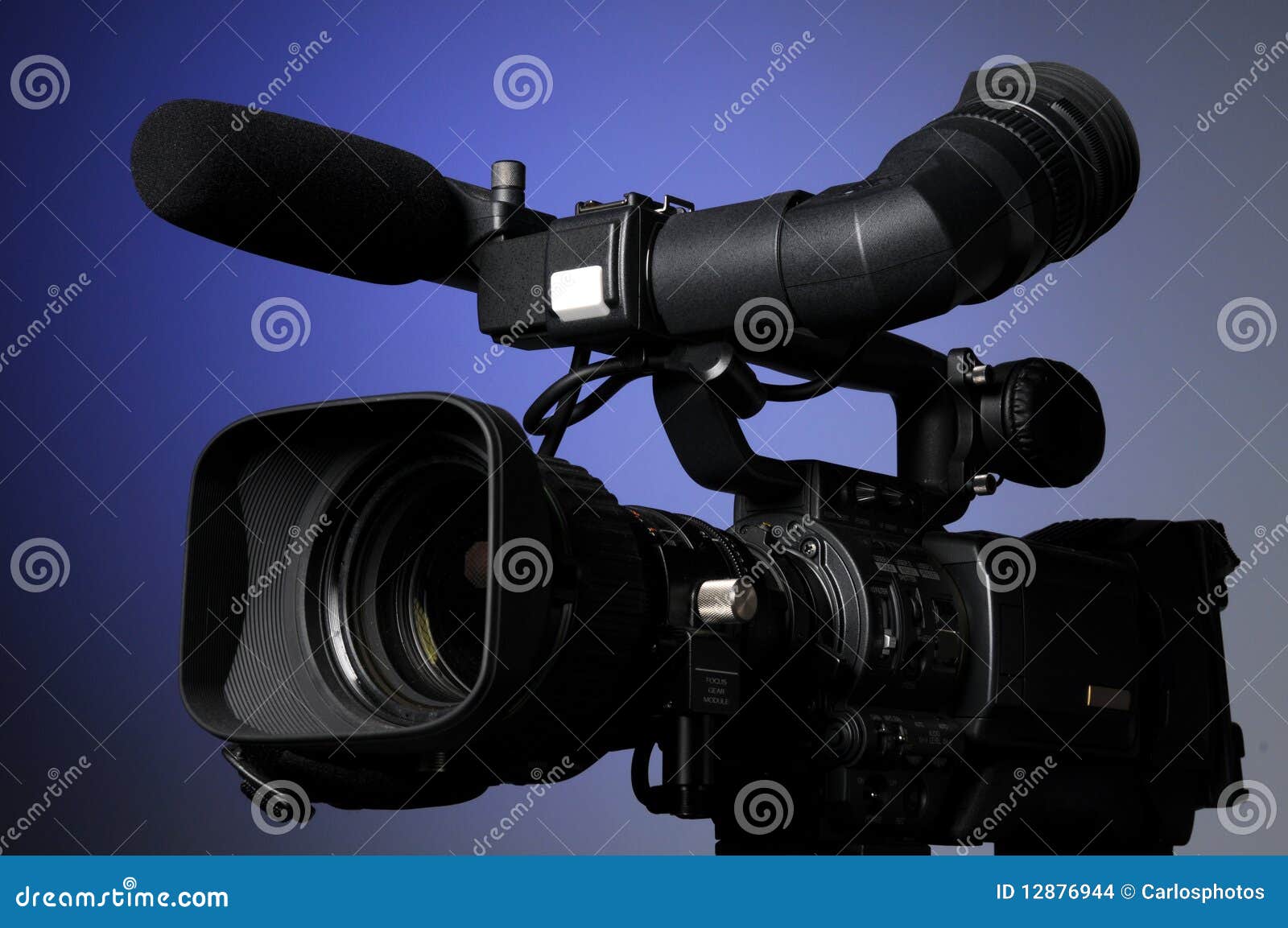 Professional Video Camera Stands On A Tripod, The Process Of Filming A ...